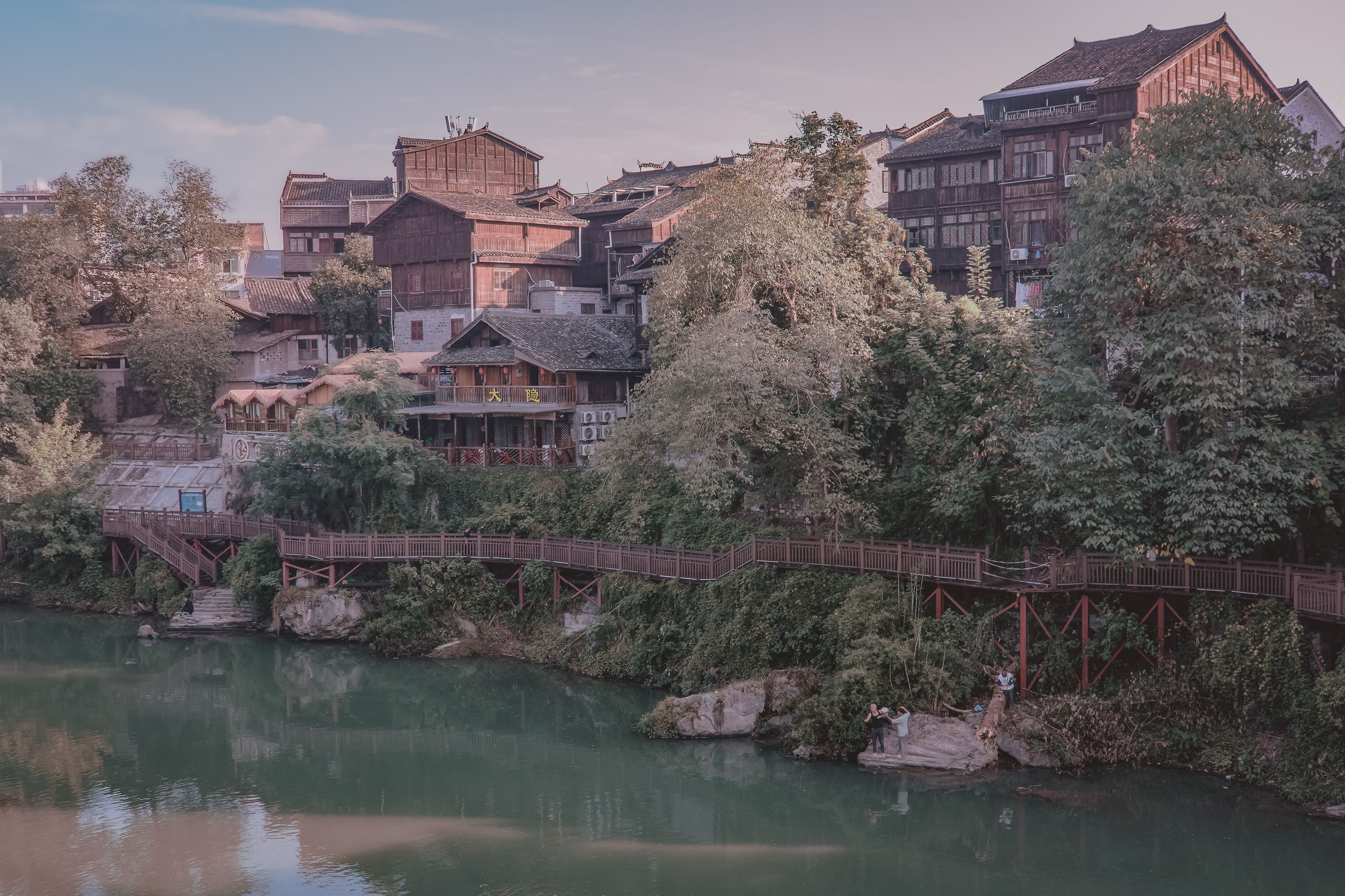 Bridge Along River in Small Town · Free Stock Photo