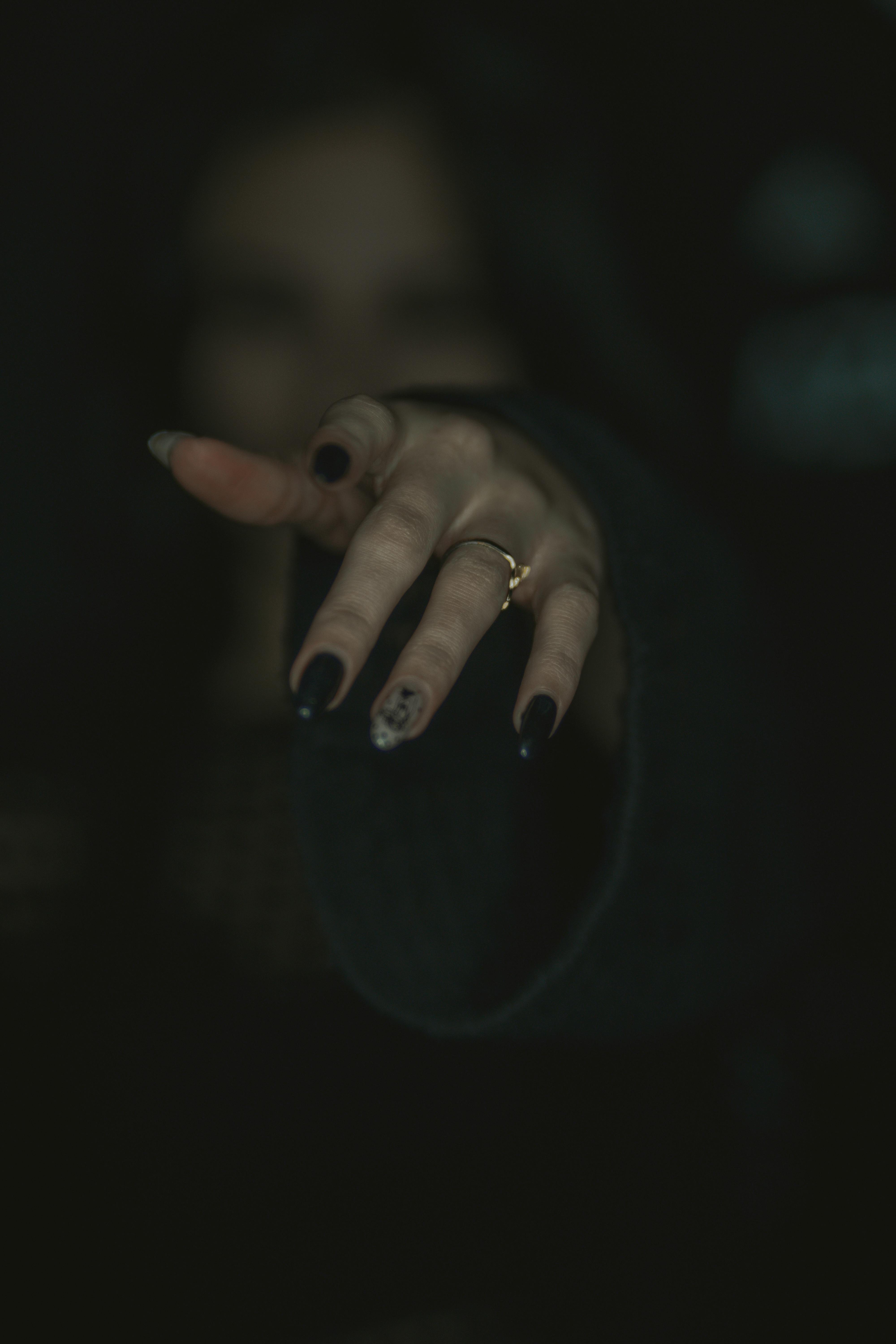 Woman Hand in Darkness · Free Stock Photo