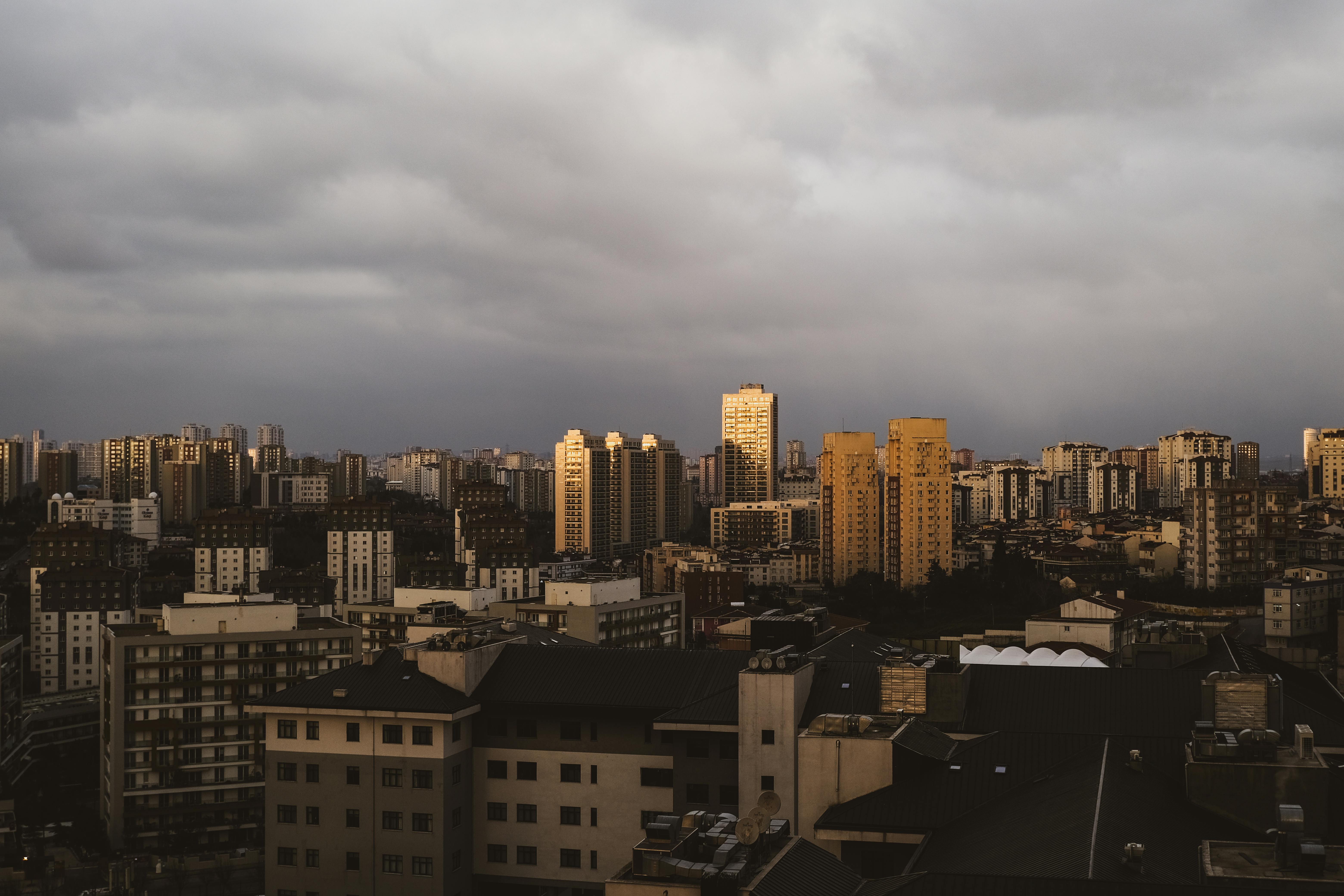 Residential Buildings Under Cloudy Sky · Free Stock Photo