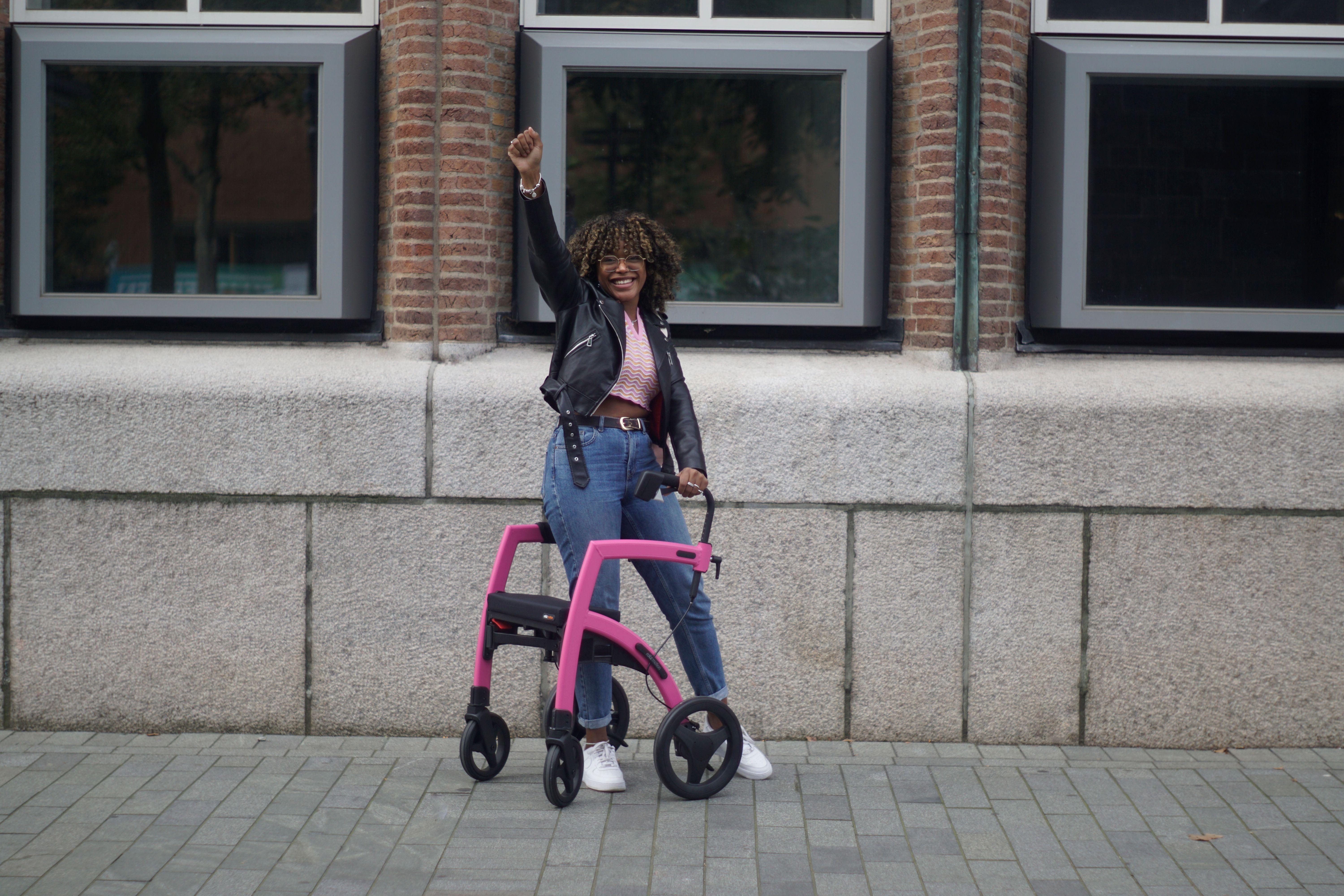 Young woman with a rollator walker · Free Stock Photo