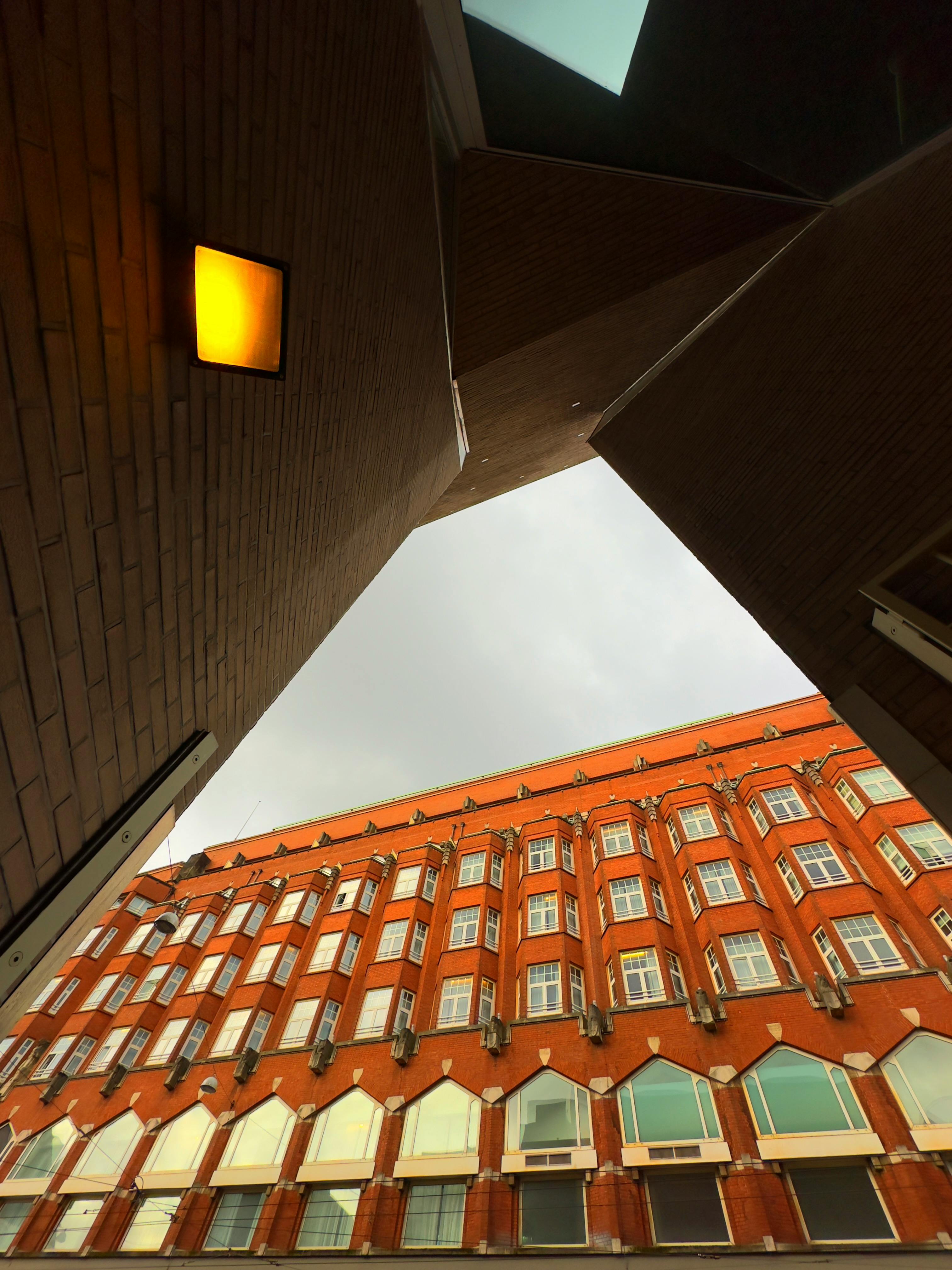 Traditional Brick Building by the Square · Free Stock Photo