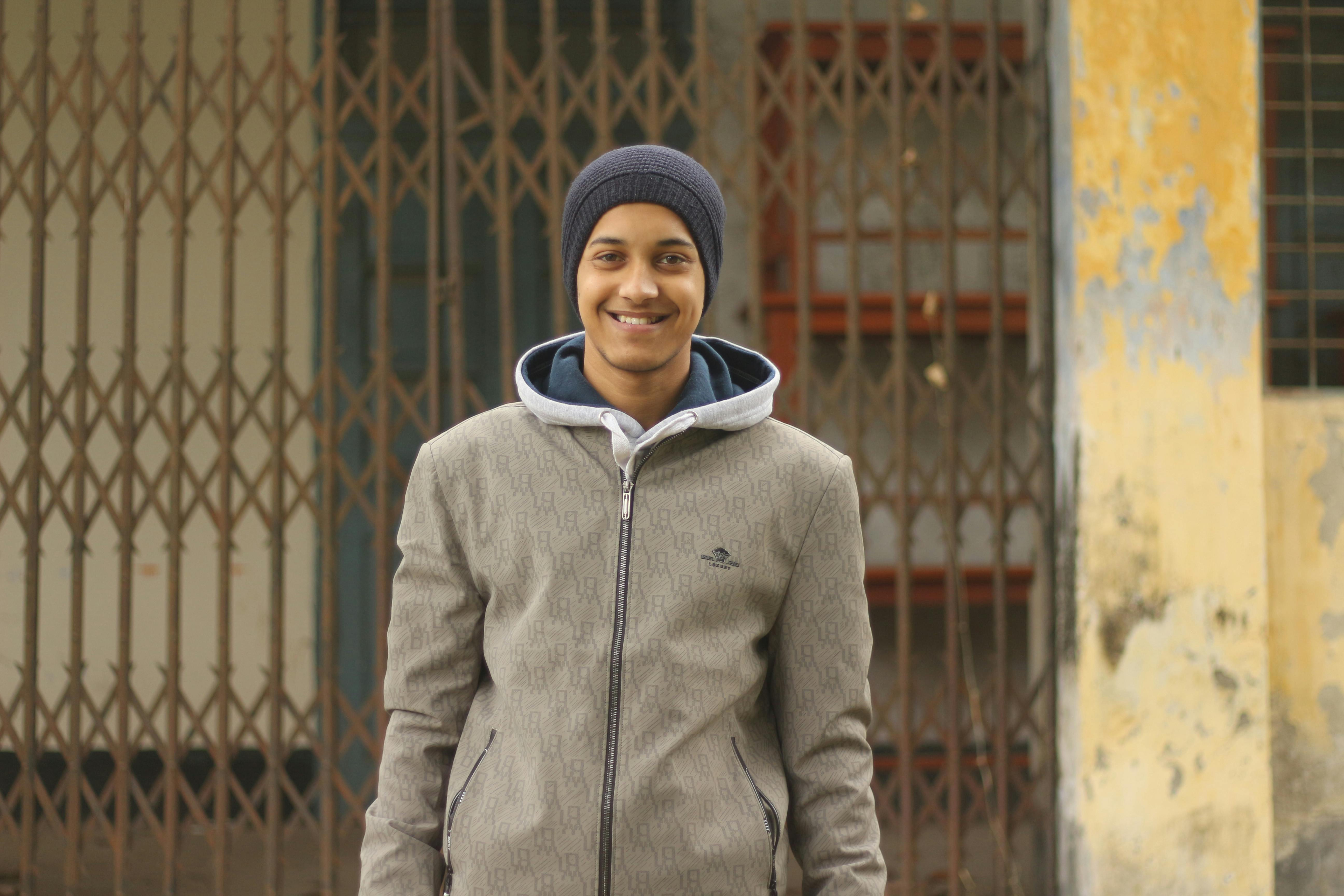 Smiling Man in Hat and Jacket · Free Stock Photo