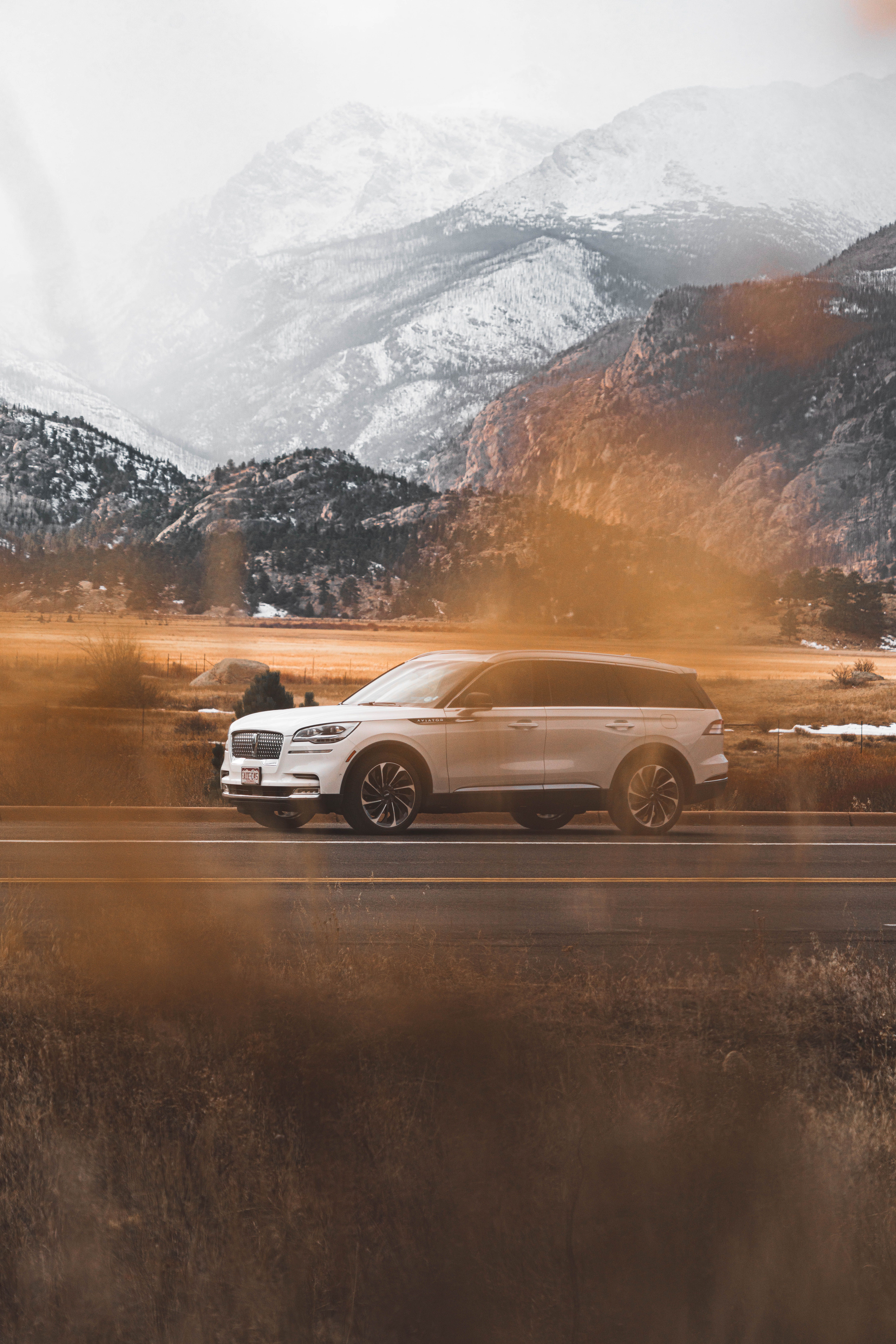 White Lincoln Aviator on Road · Free Stock Photo