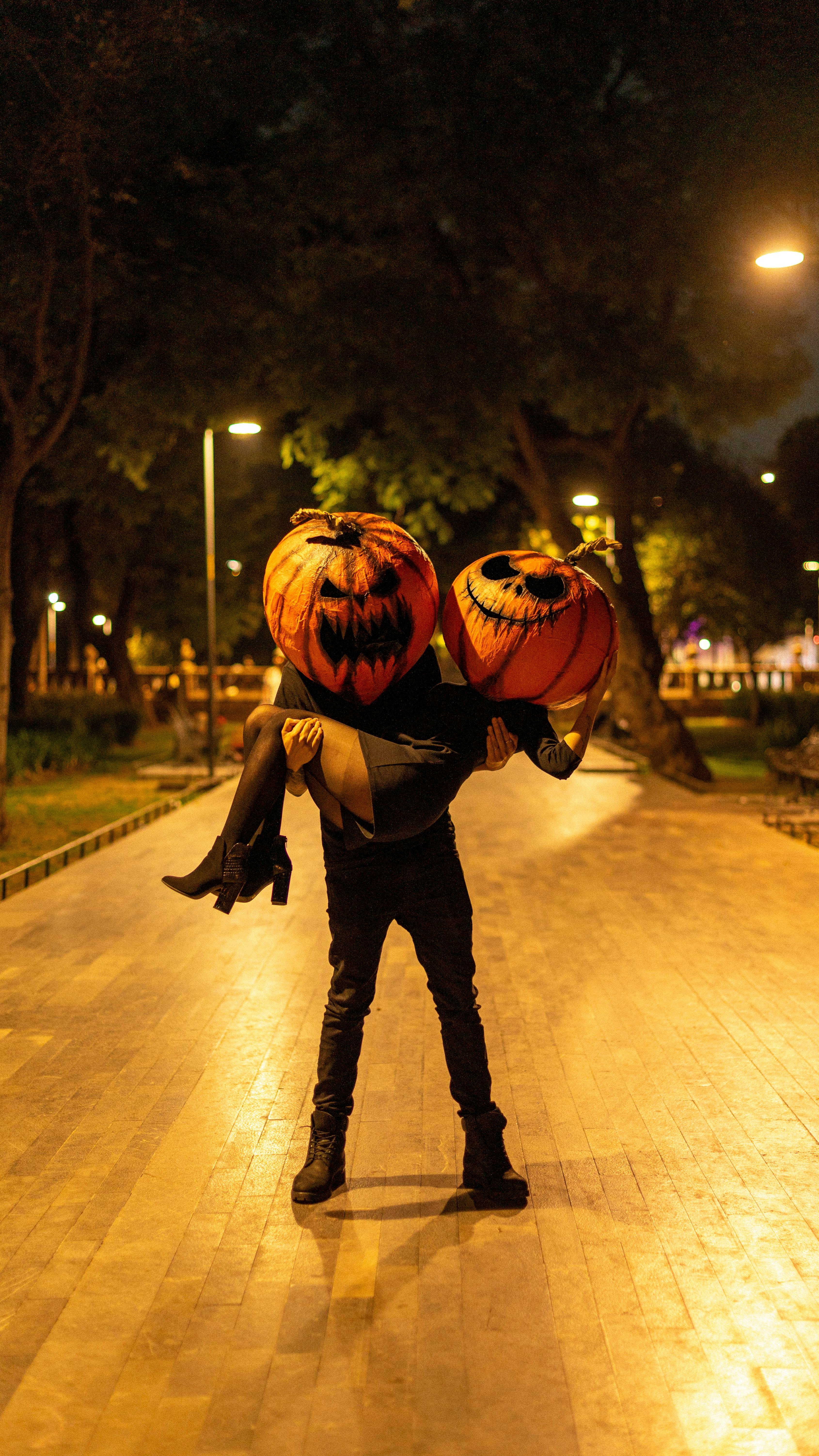 Couple Wearing Halloween Pumpkin Masks · Free Stock Photo