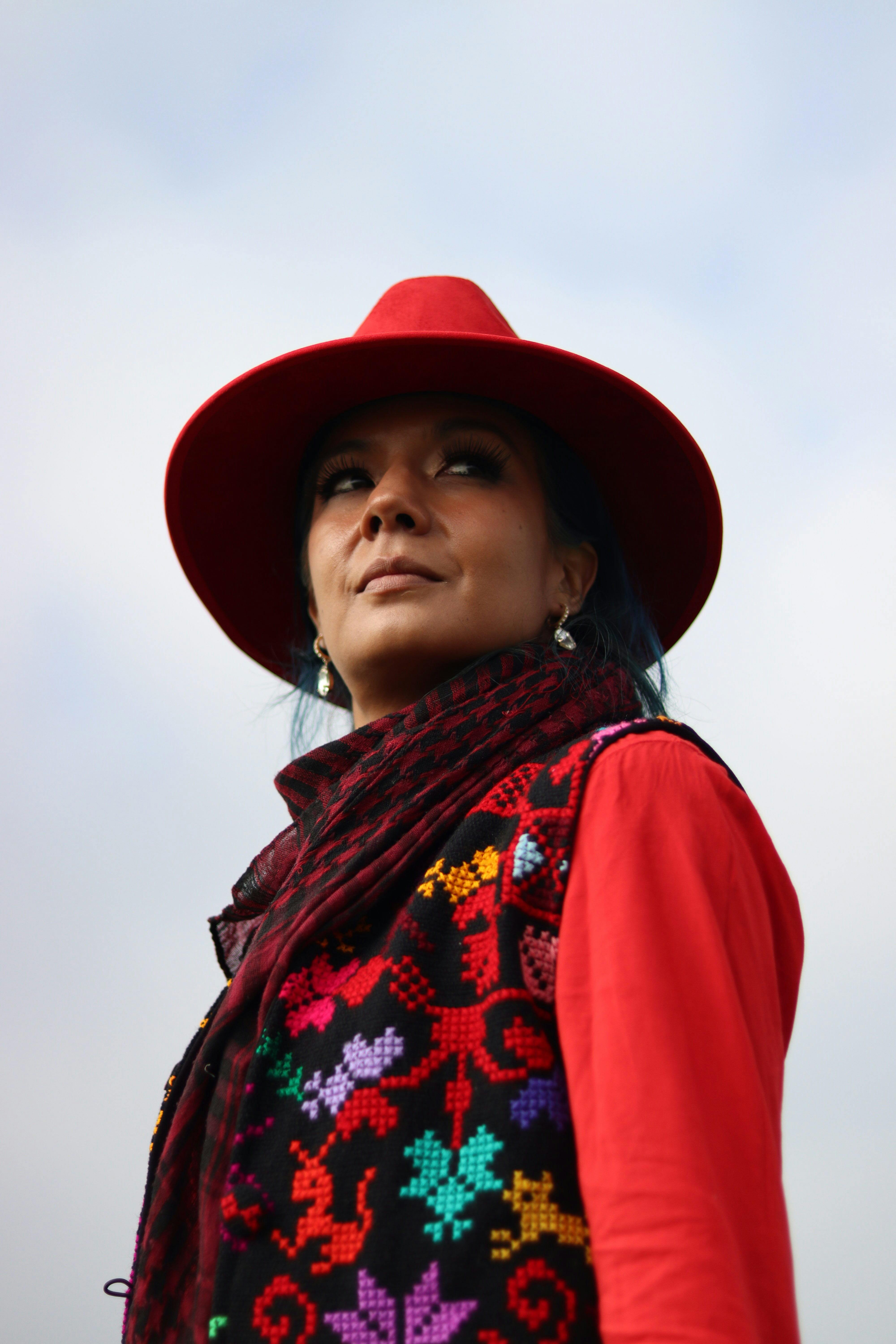 Portrait of Woman in Red Hat · Free Stock Photo