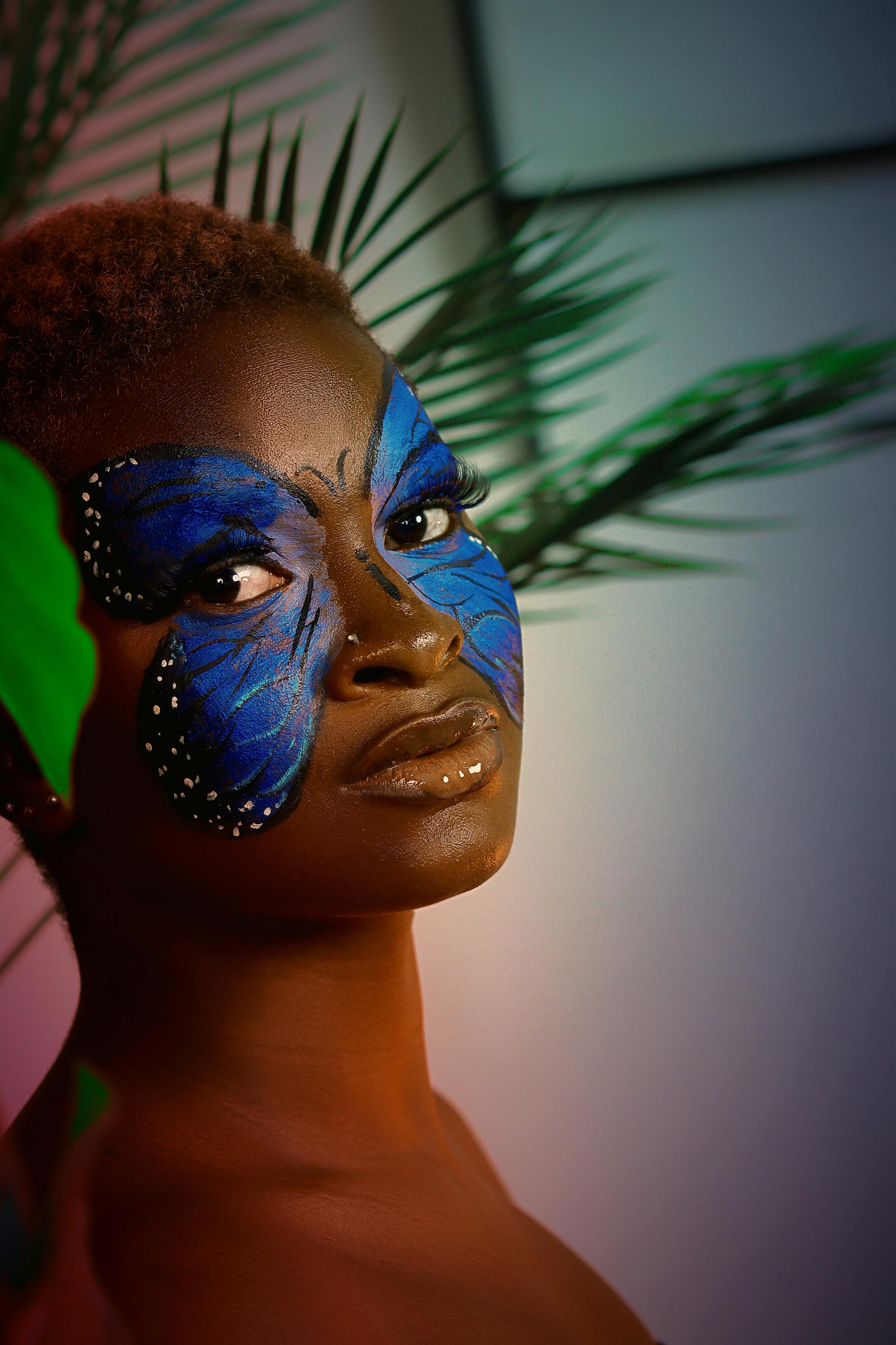 Portrait of Woman with Butterfly on Face · Free Stock Photo