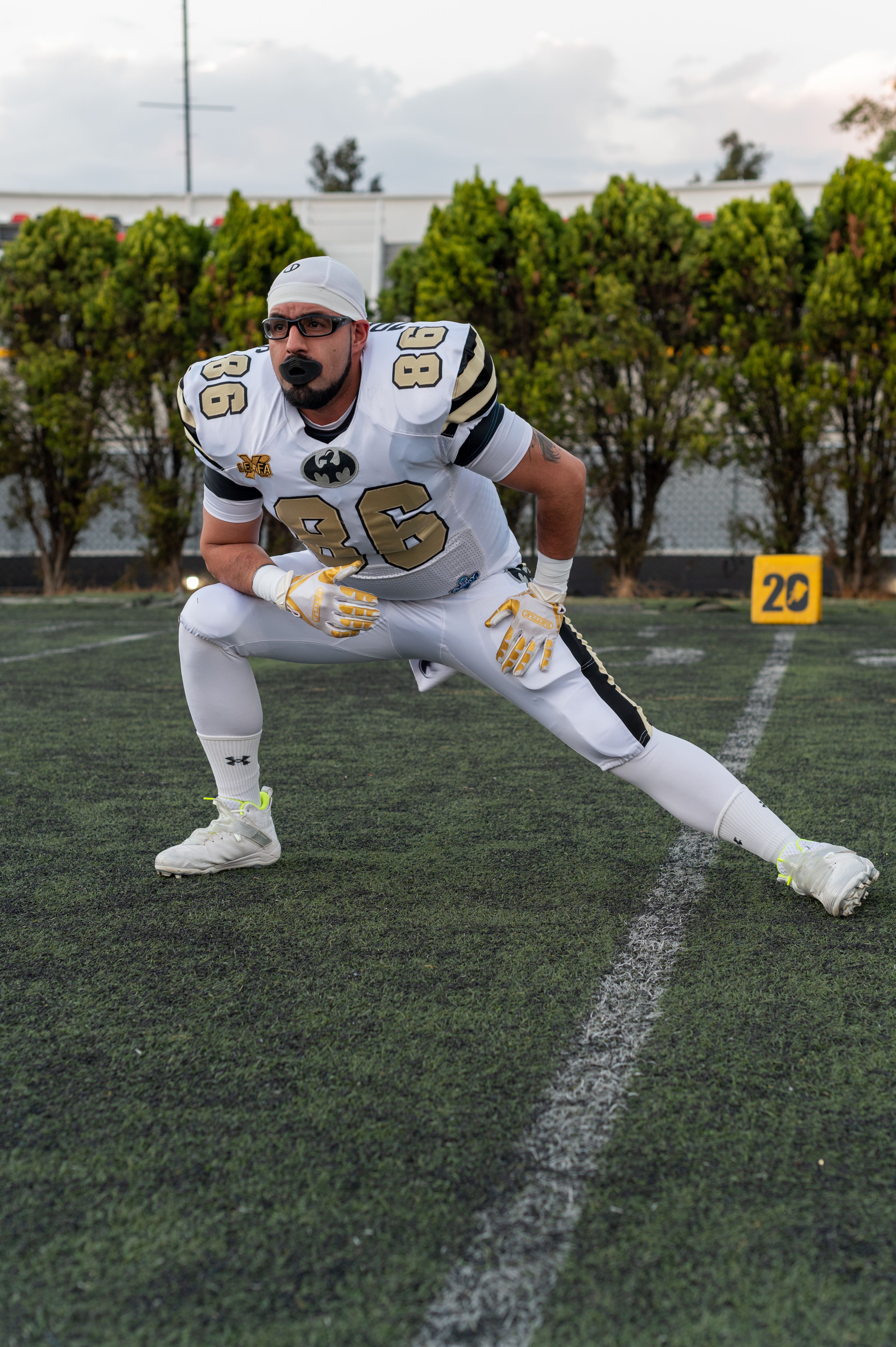 American Footballer Stretching · Free Stock Photo