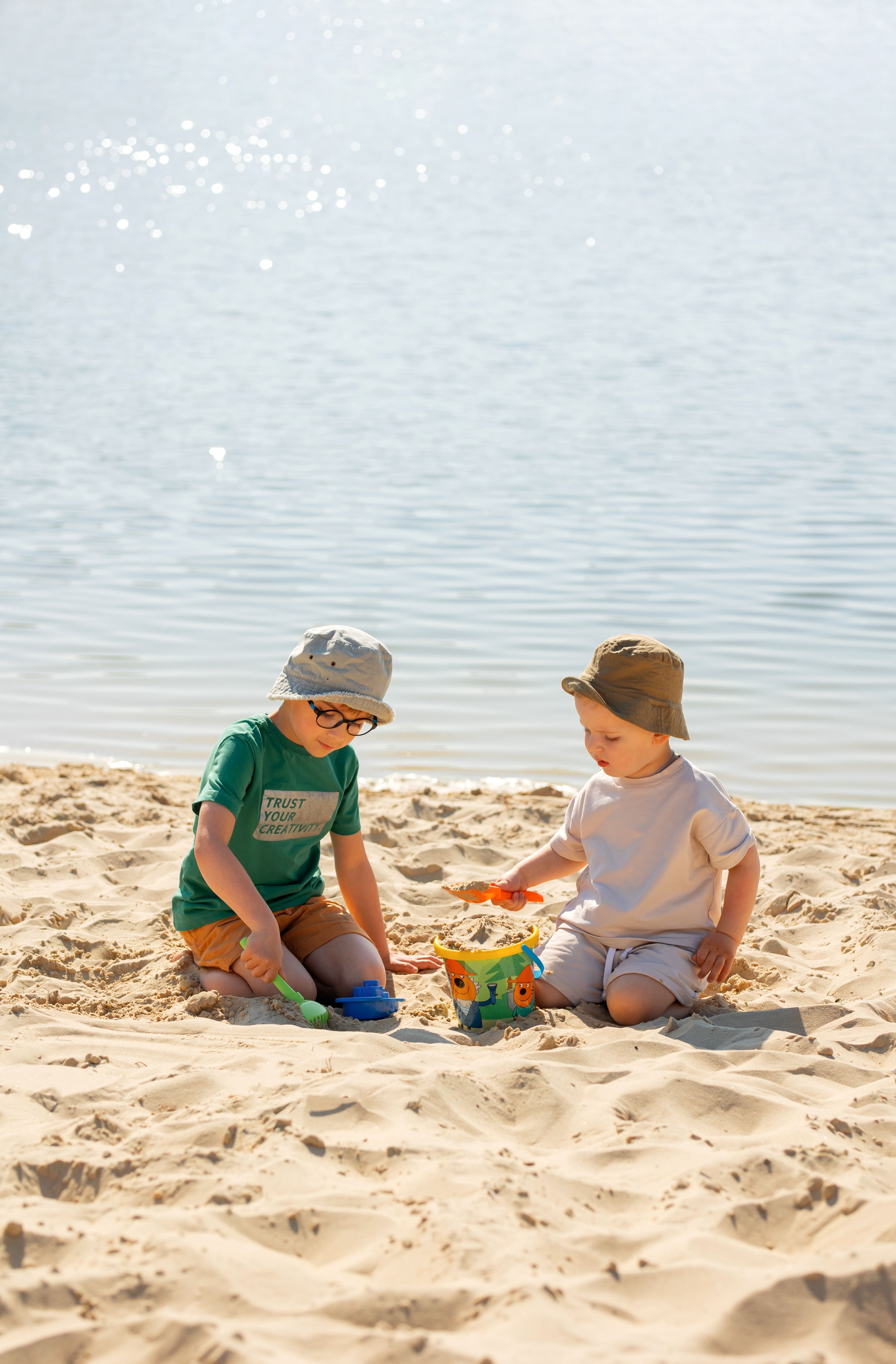 Boys Playing Sand on Beach · Free Stock Photo