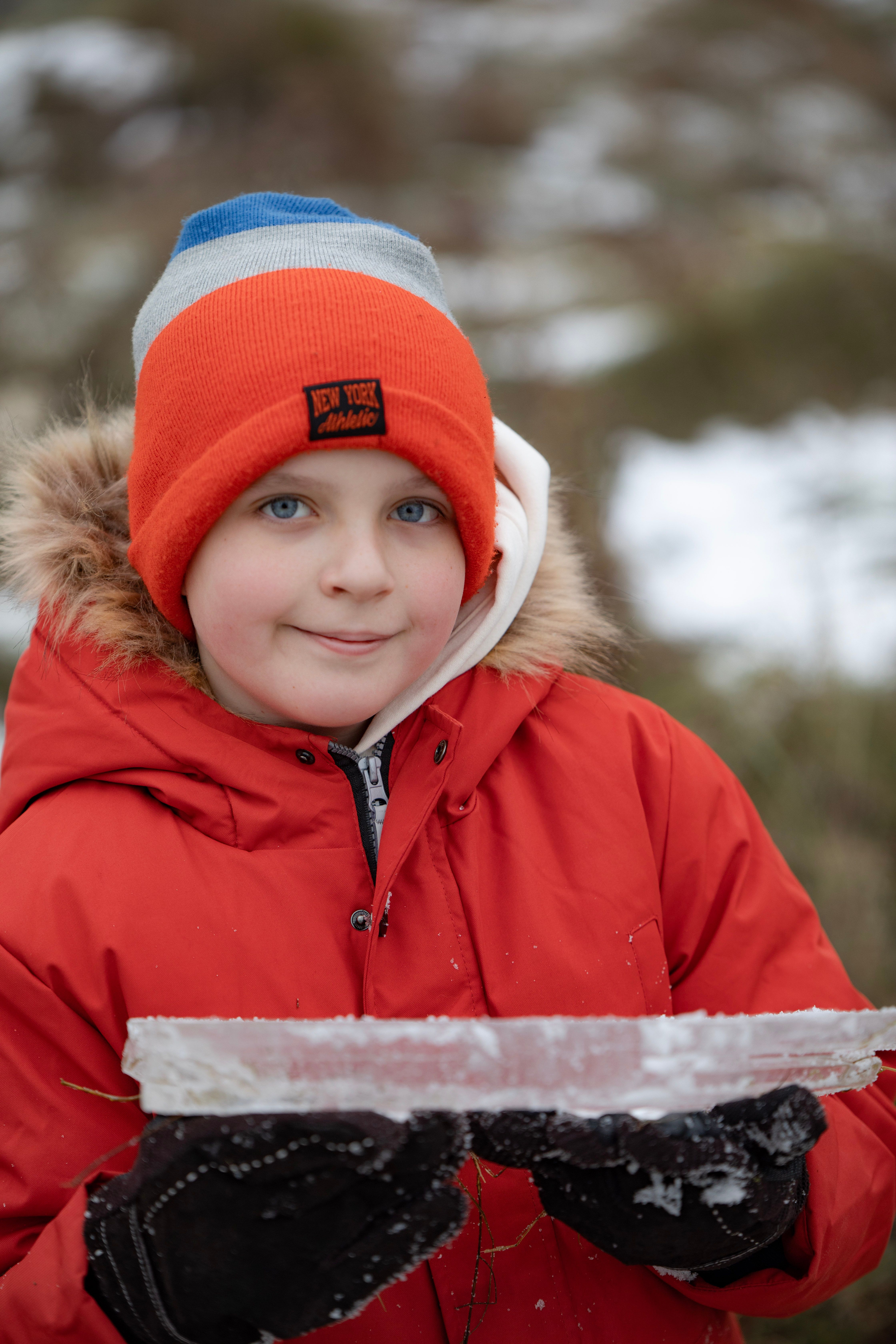A Kid with an Ice Slab · Free Stock Photo