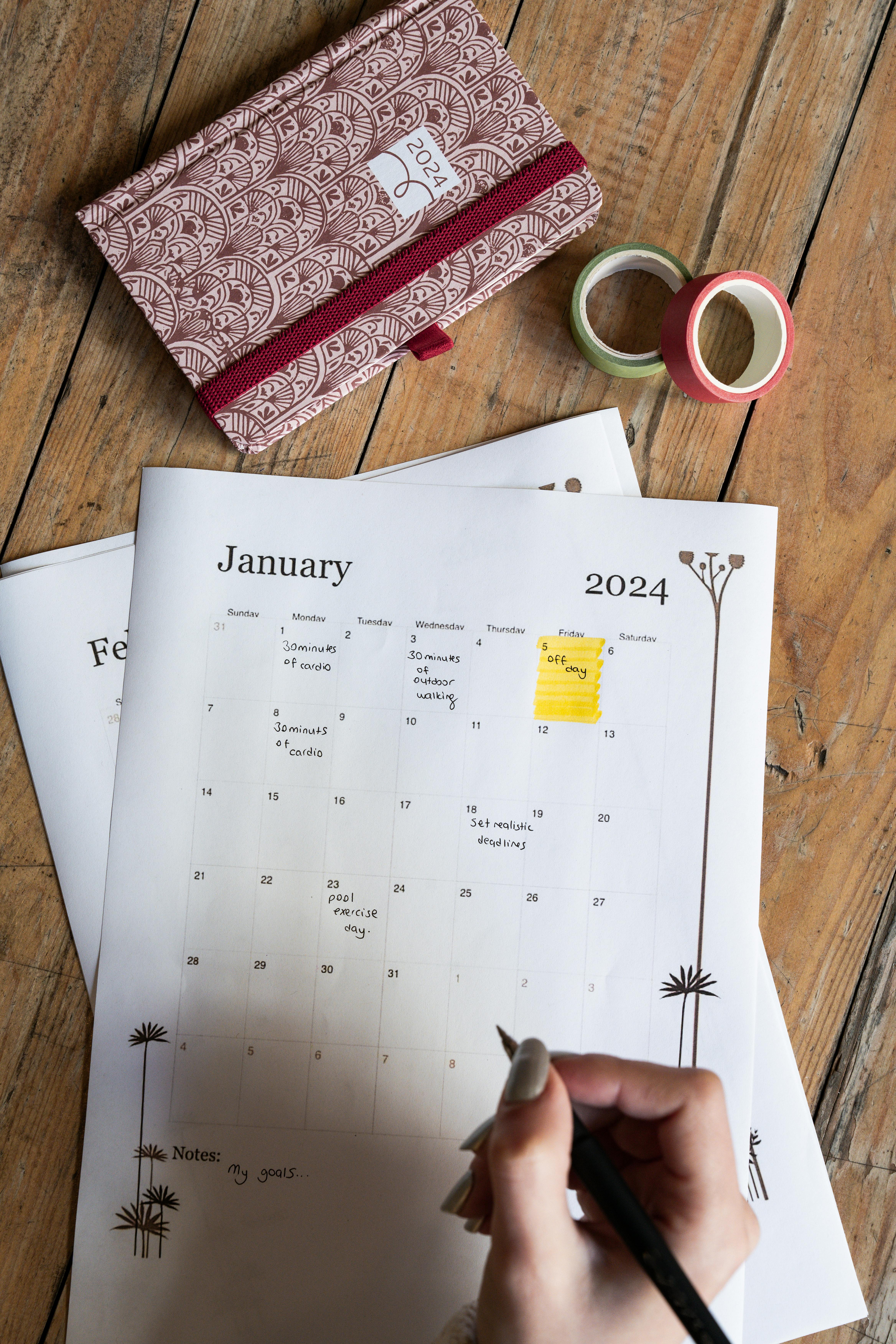 Photo of Planner and Writing Materials · Free Stock Photo