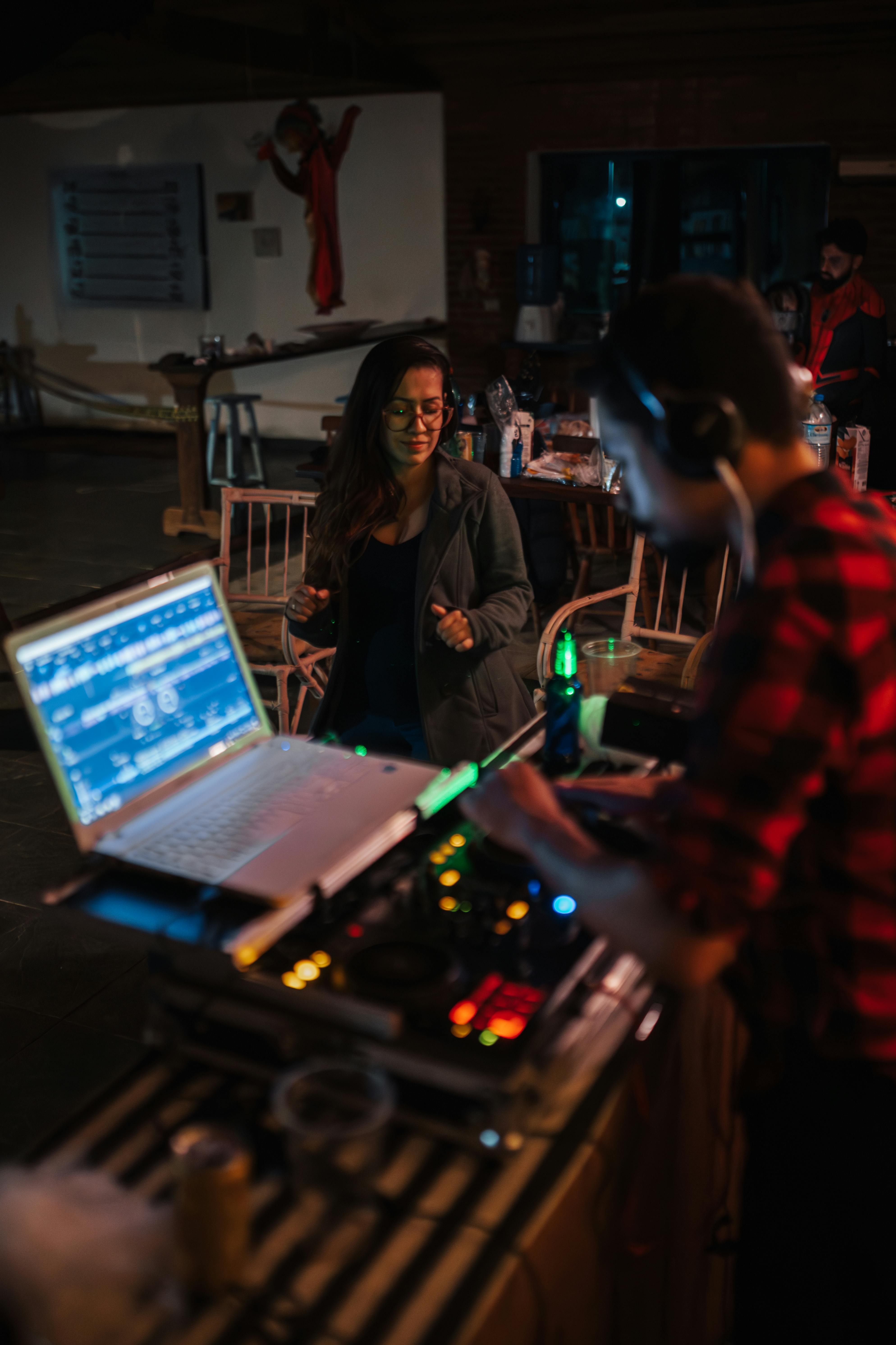 Woman Dancing behind DJ · Free Stock Photo