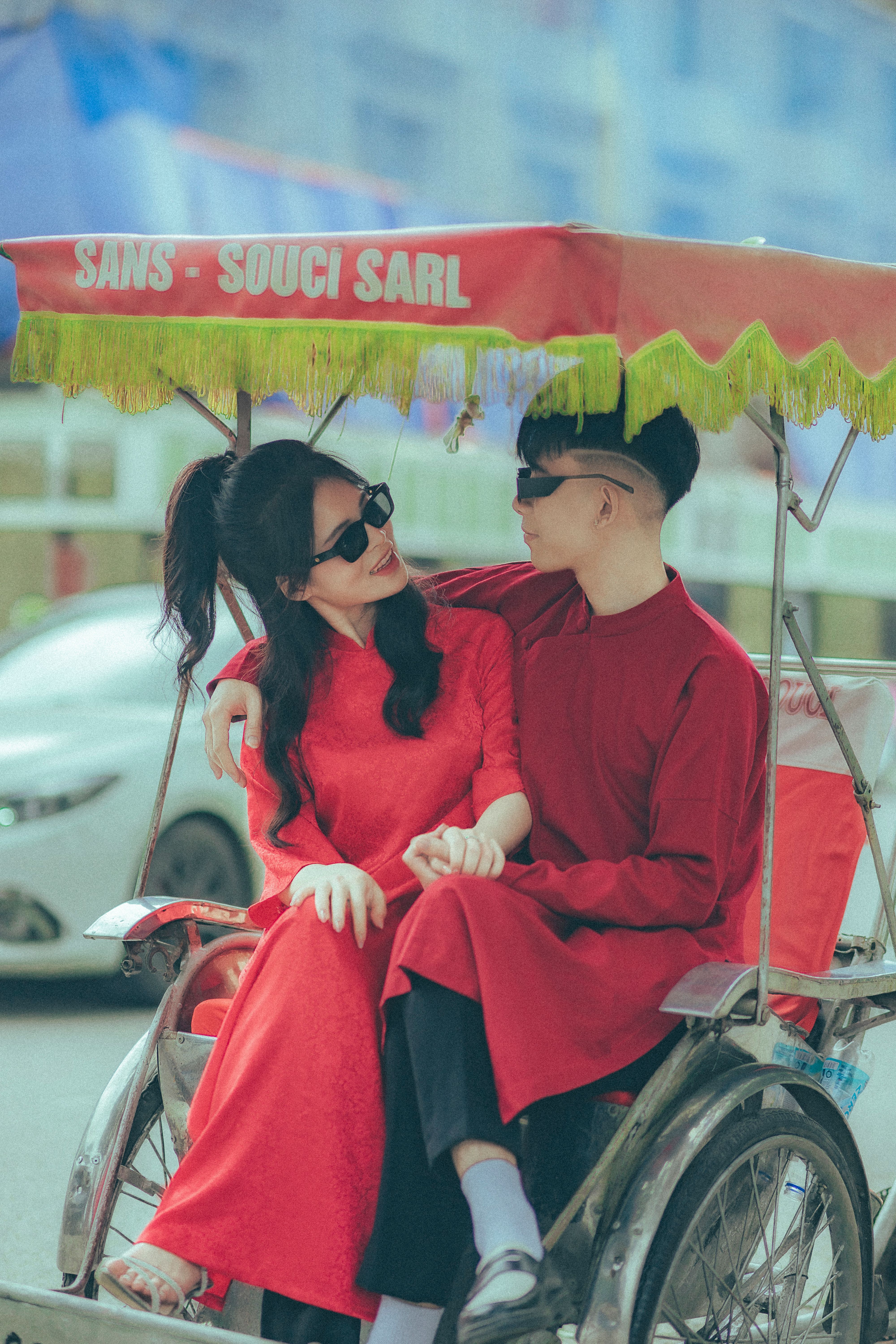 Couple Wearing Red Gowns on a Street · Free Stock Photo