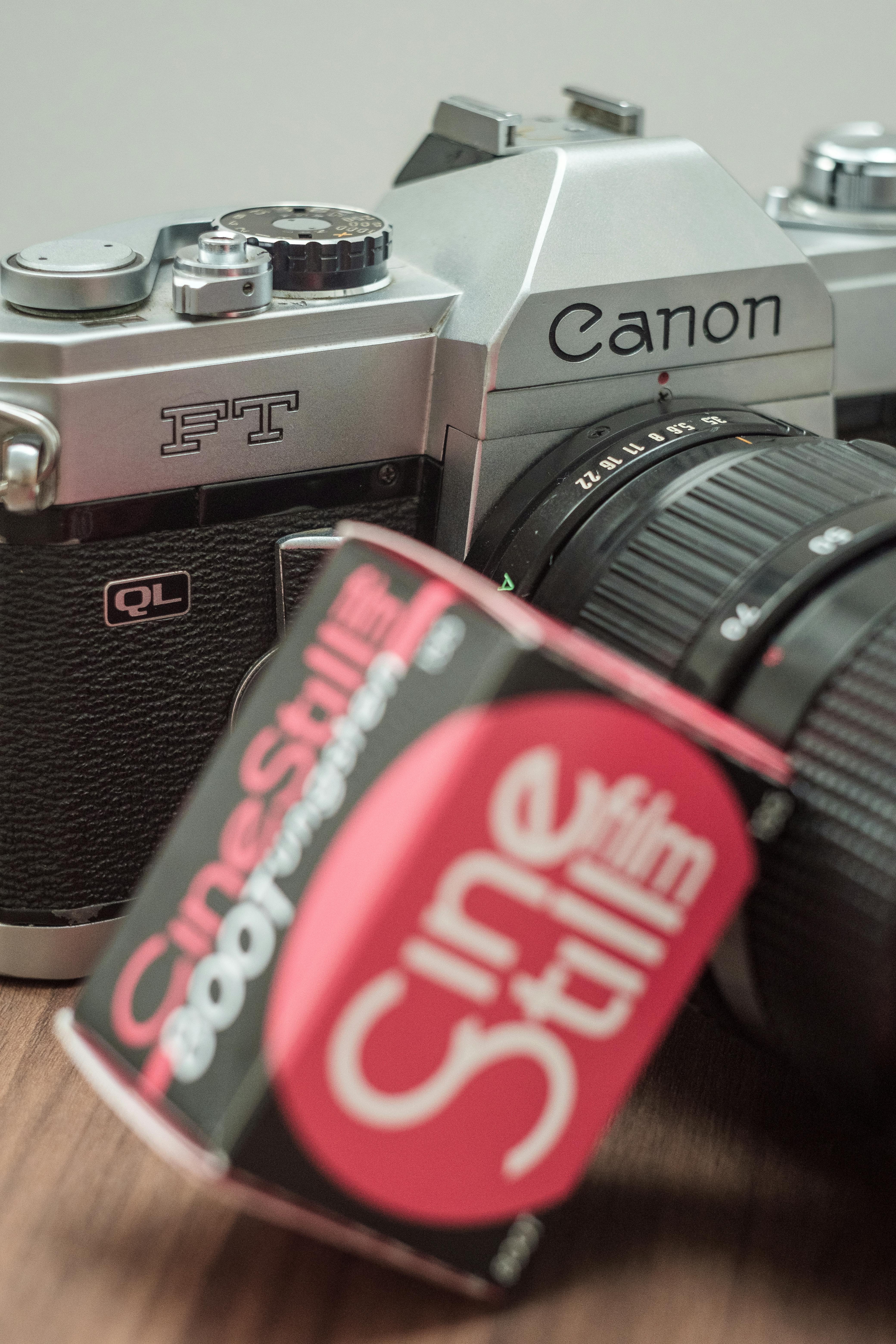 Canon Camera and Box of Photographic Film · Free Stock Photo