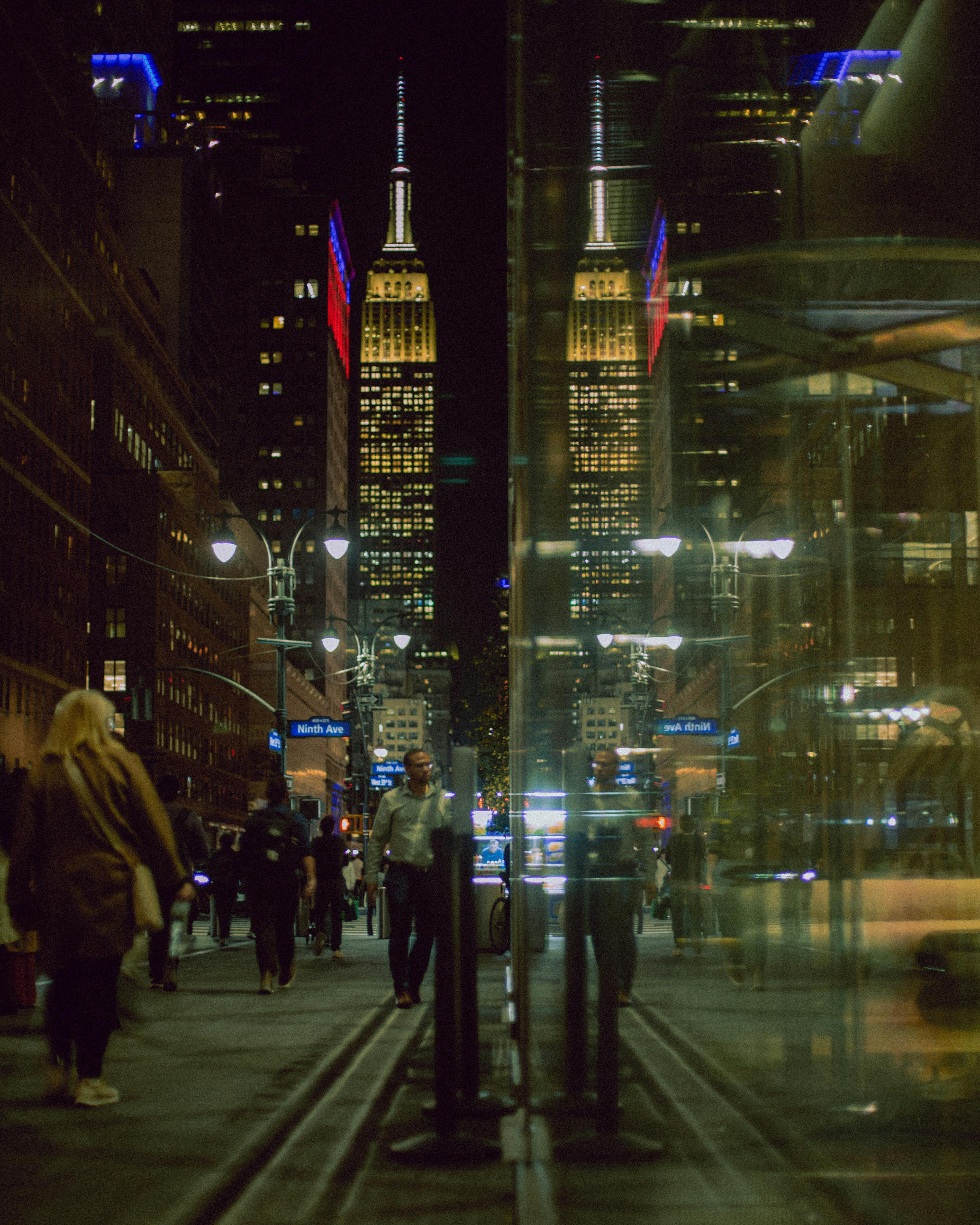 People Walking Near High Rise Buildings · Free Stock Photo