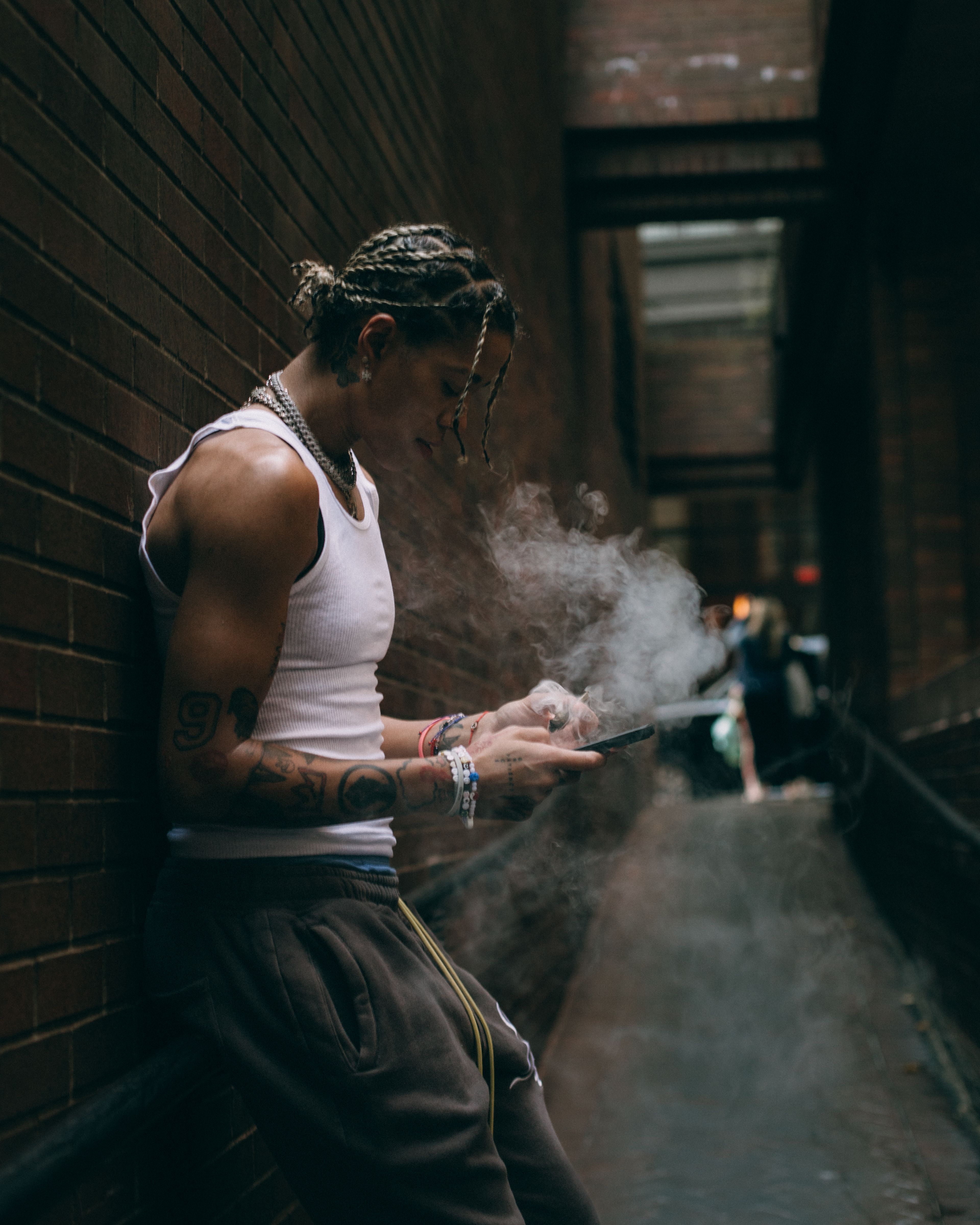 Smoking Woman in Alley in Town · Free Stock Photo