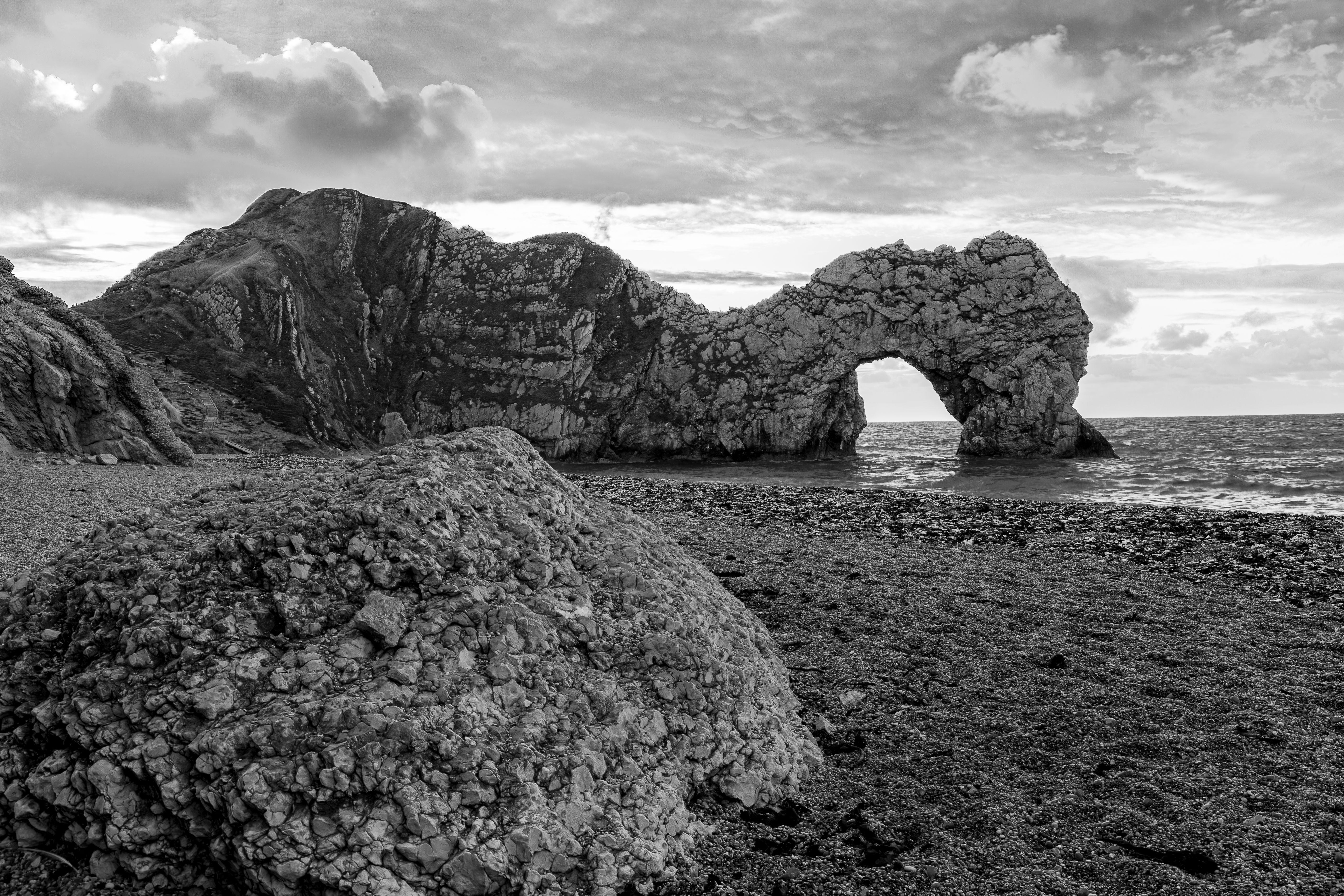 Natural Arch on Sea Shore in Black and White · Free Stock Photo