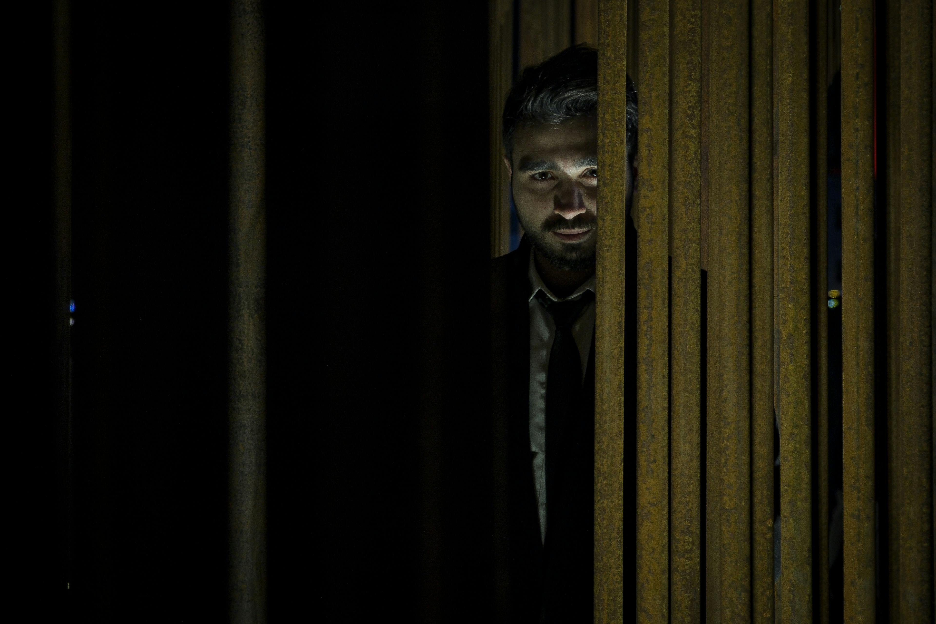 Lurking Man in a Tie · Free Stock Photo