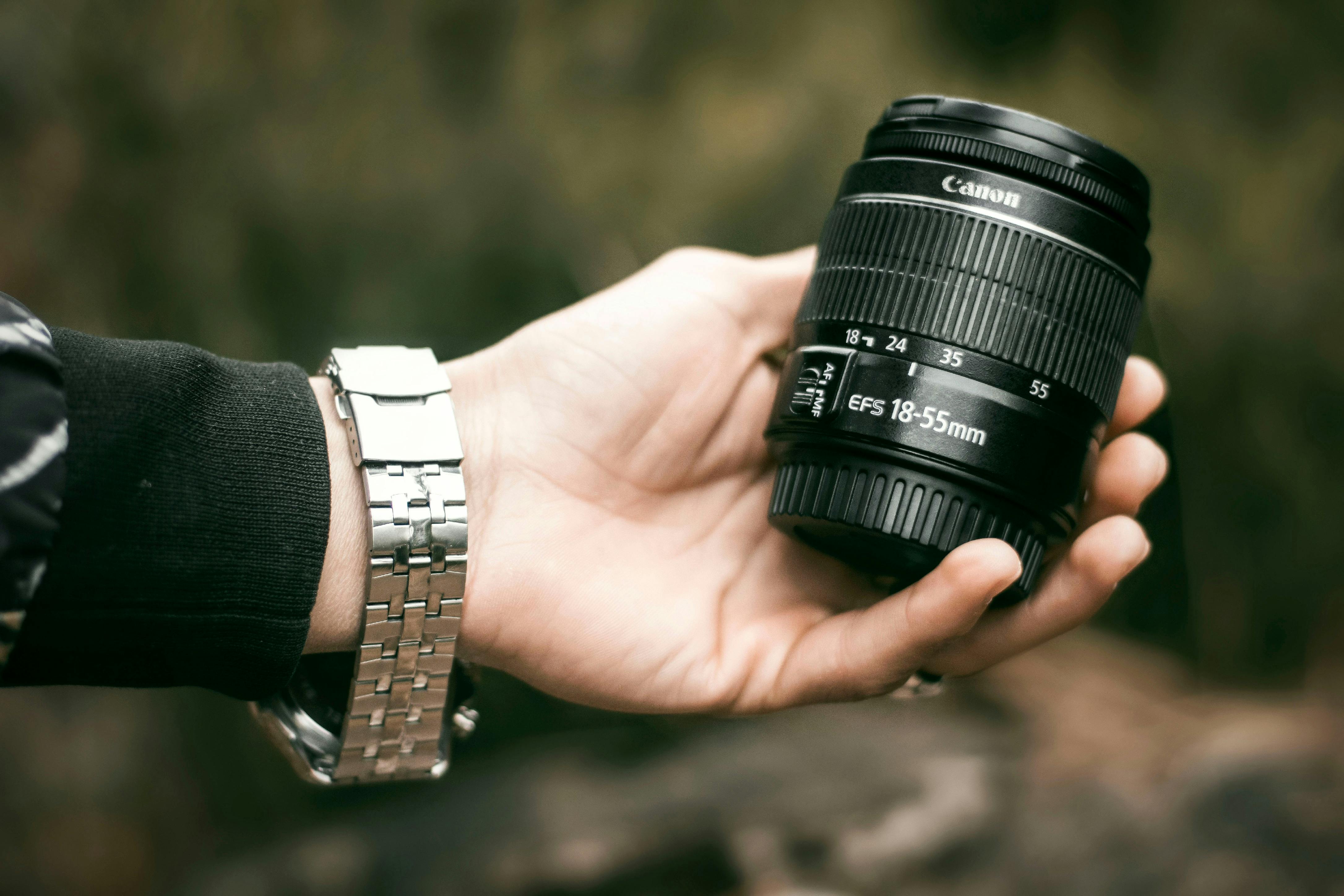 Hand Holding Camera Lens · Free Stock Photo