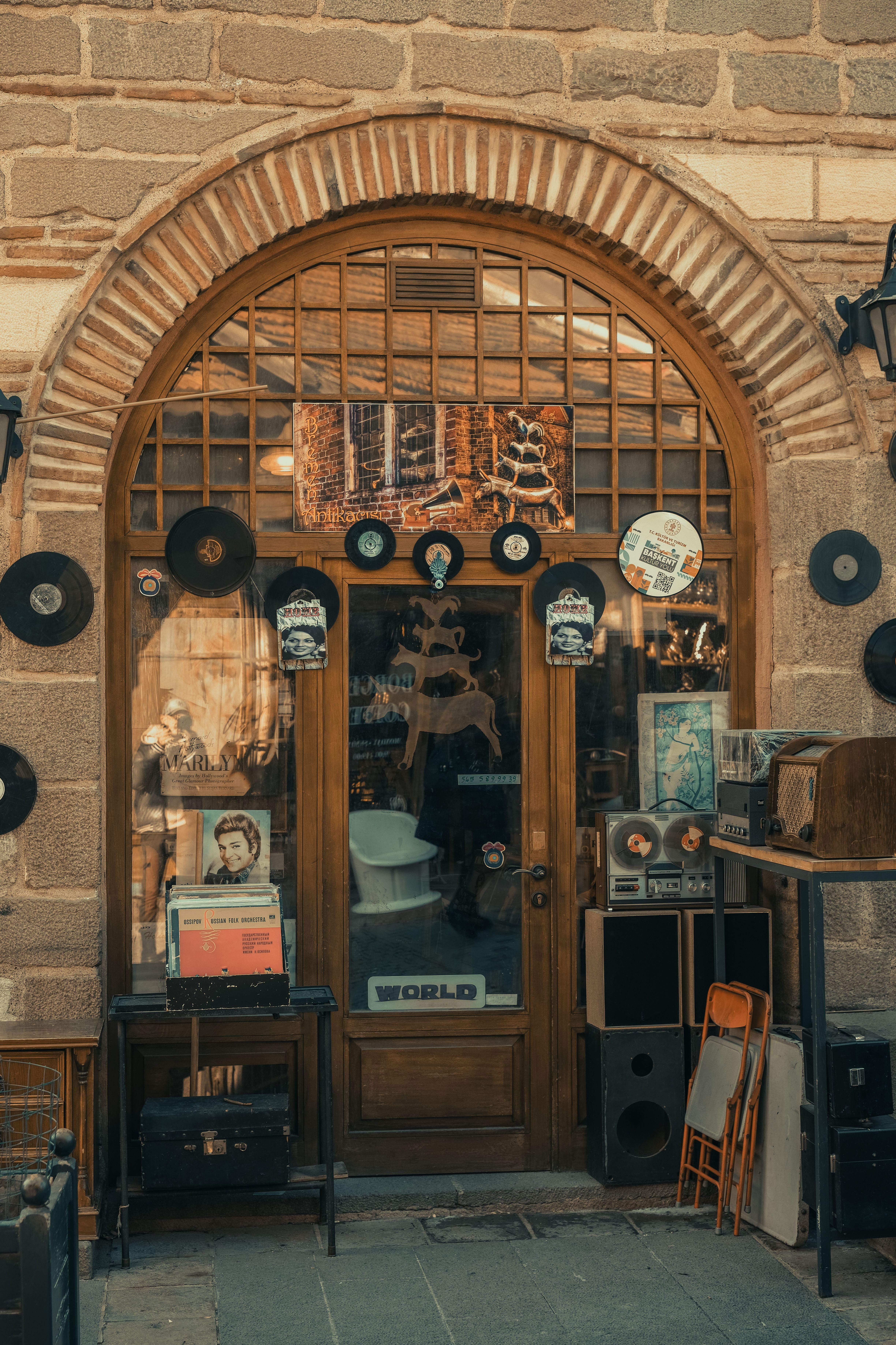 Vintage Storefront with Classic Posters and Vinyls · Free Stock Photo