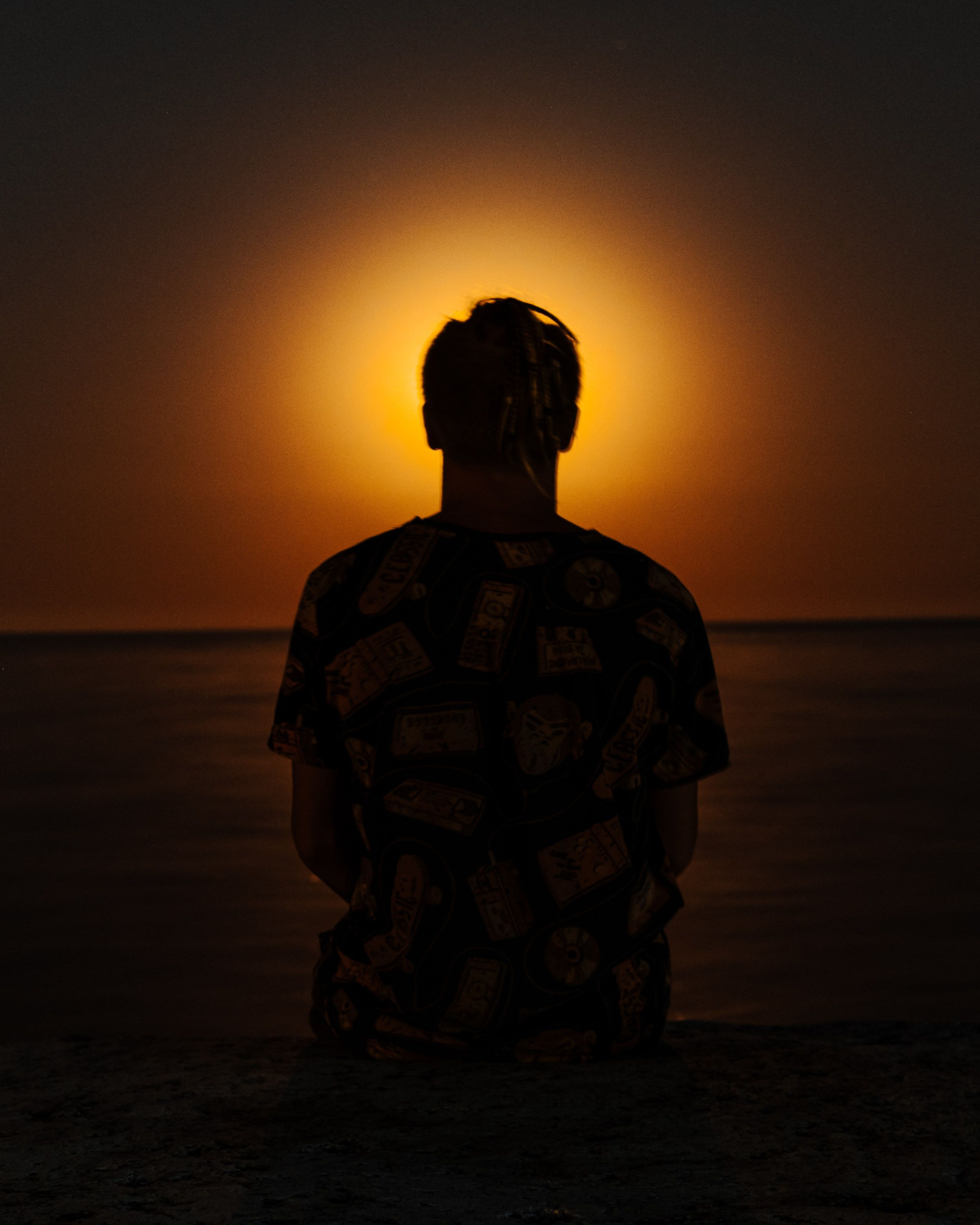 Silhouette of Man at Sunset · Free Stock Photo
