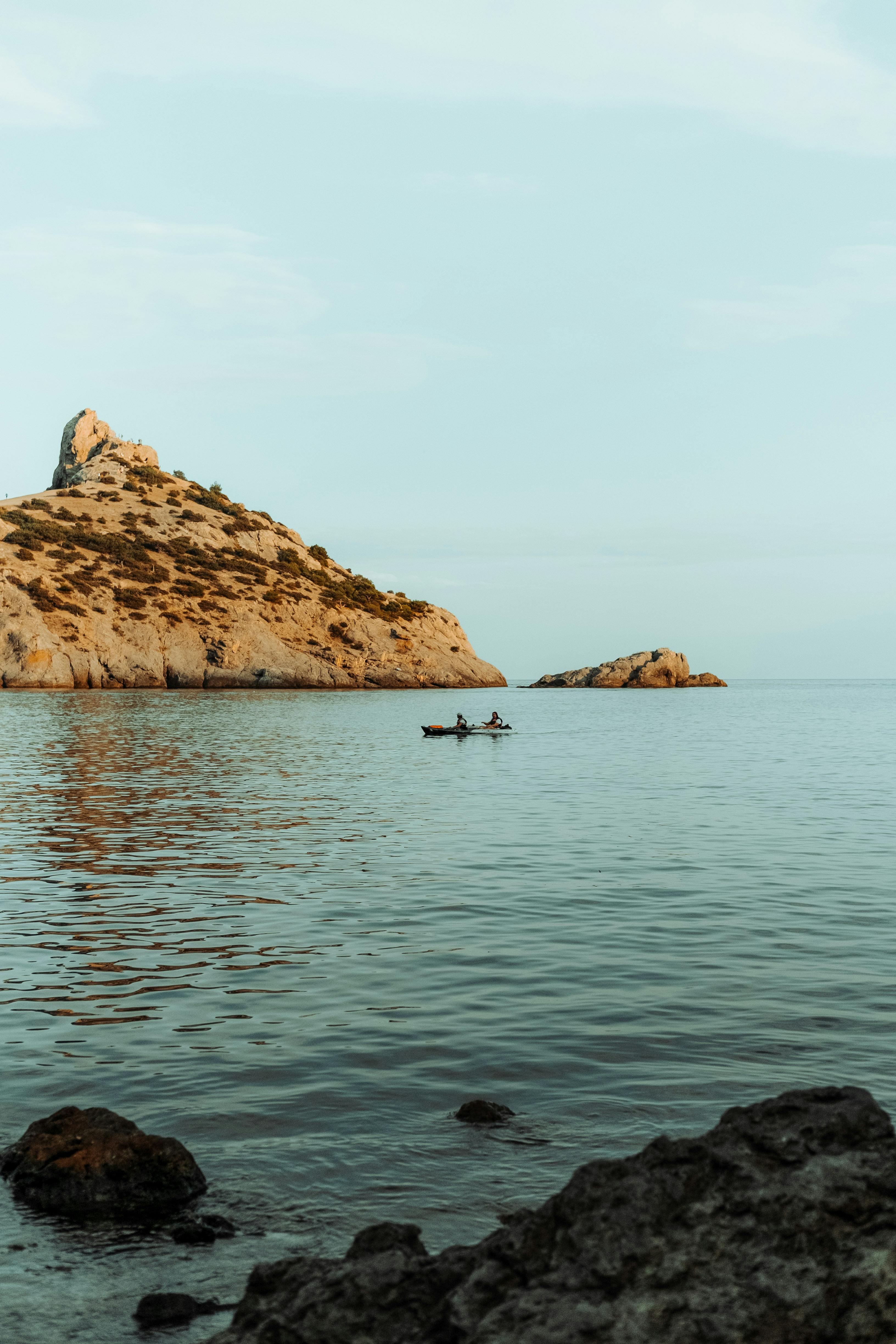 High Angle Shot Of People Rowing Boat · Free Stock Photo