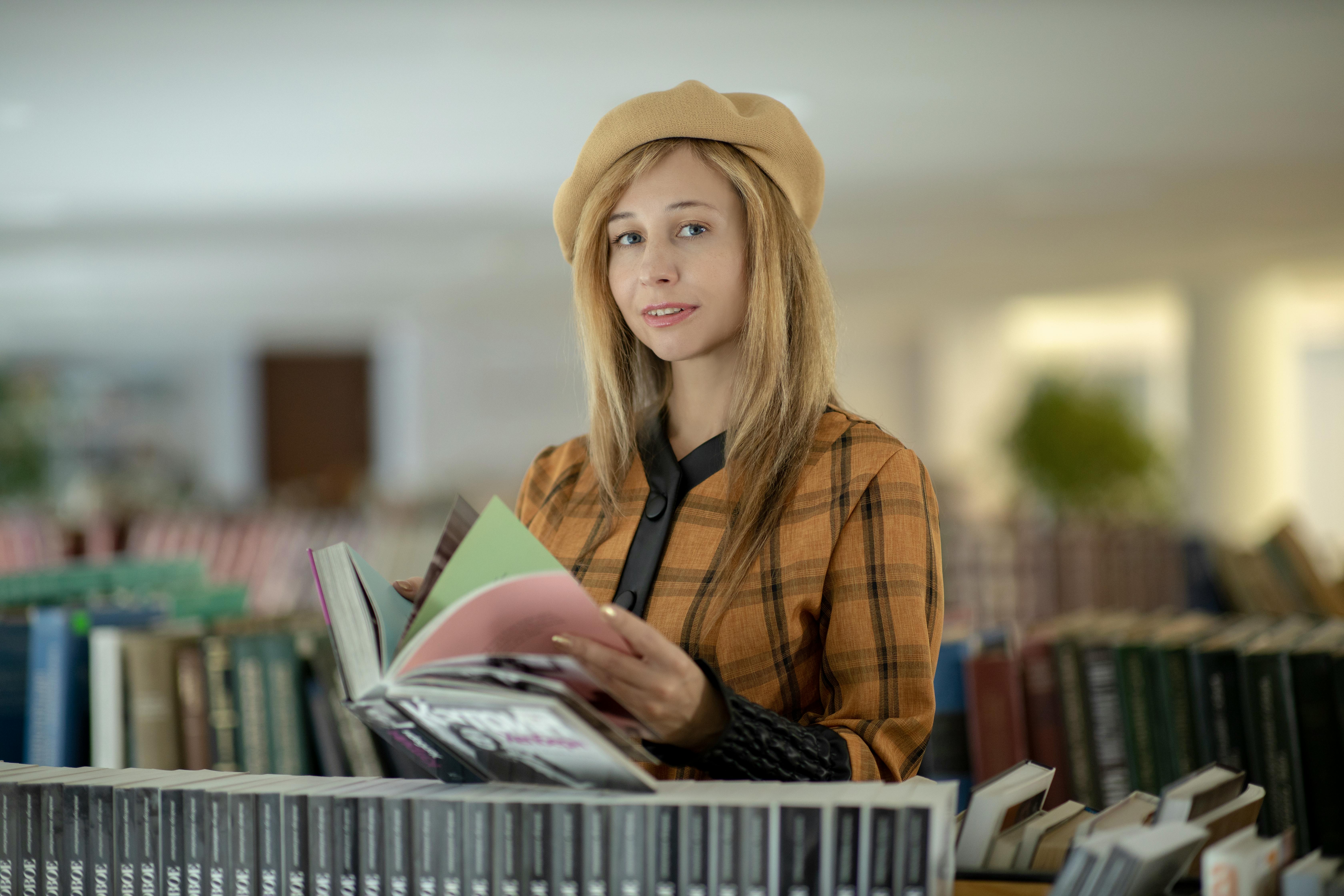 A Woman in a Library · Free Stock Photo