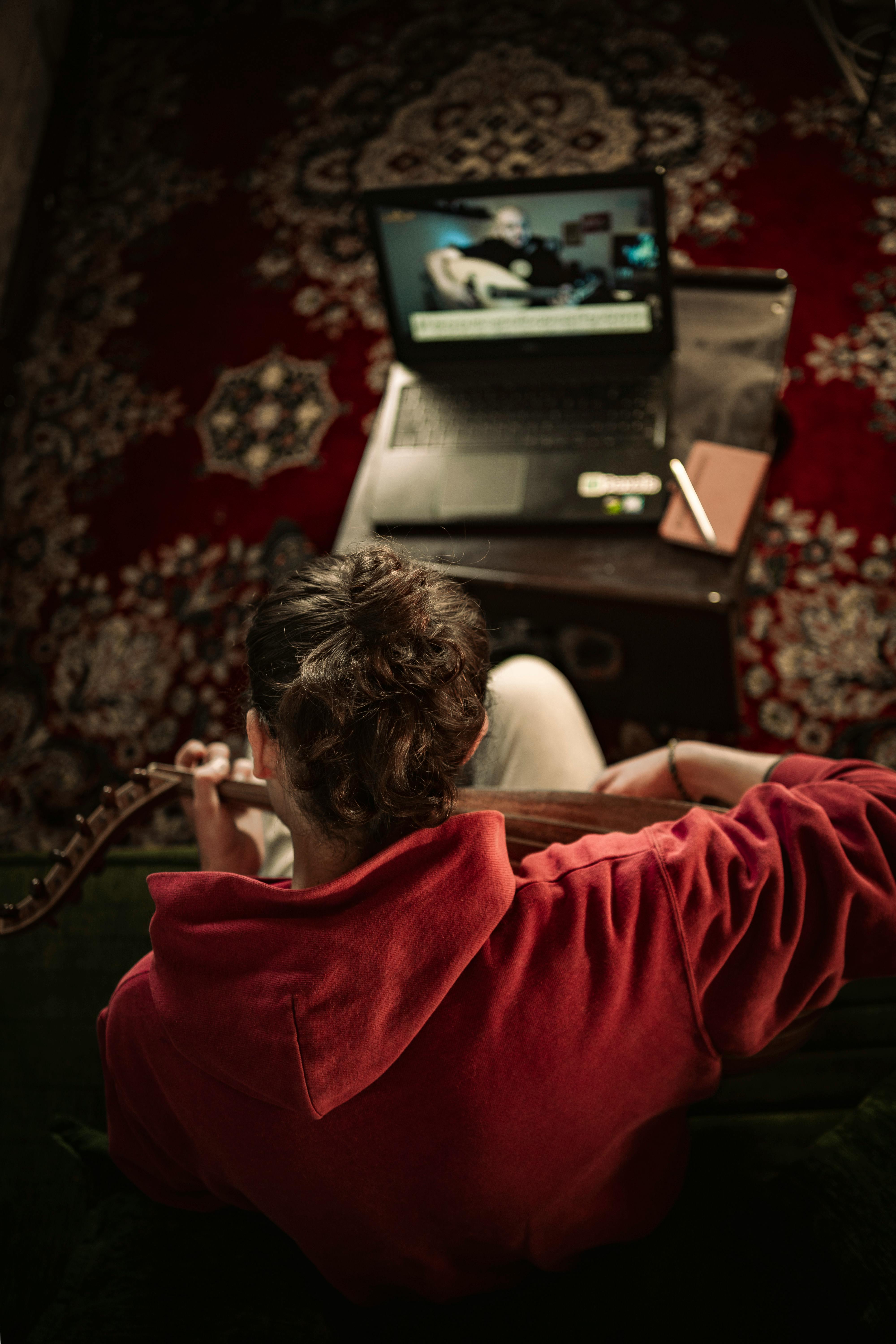 Man Watching a Movie on a Laptop · Free Stock Photo