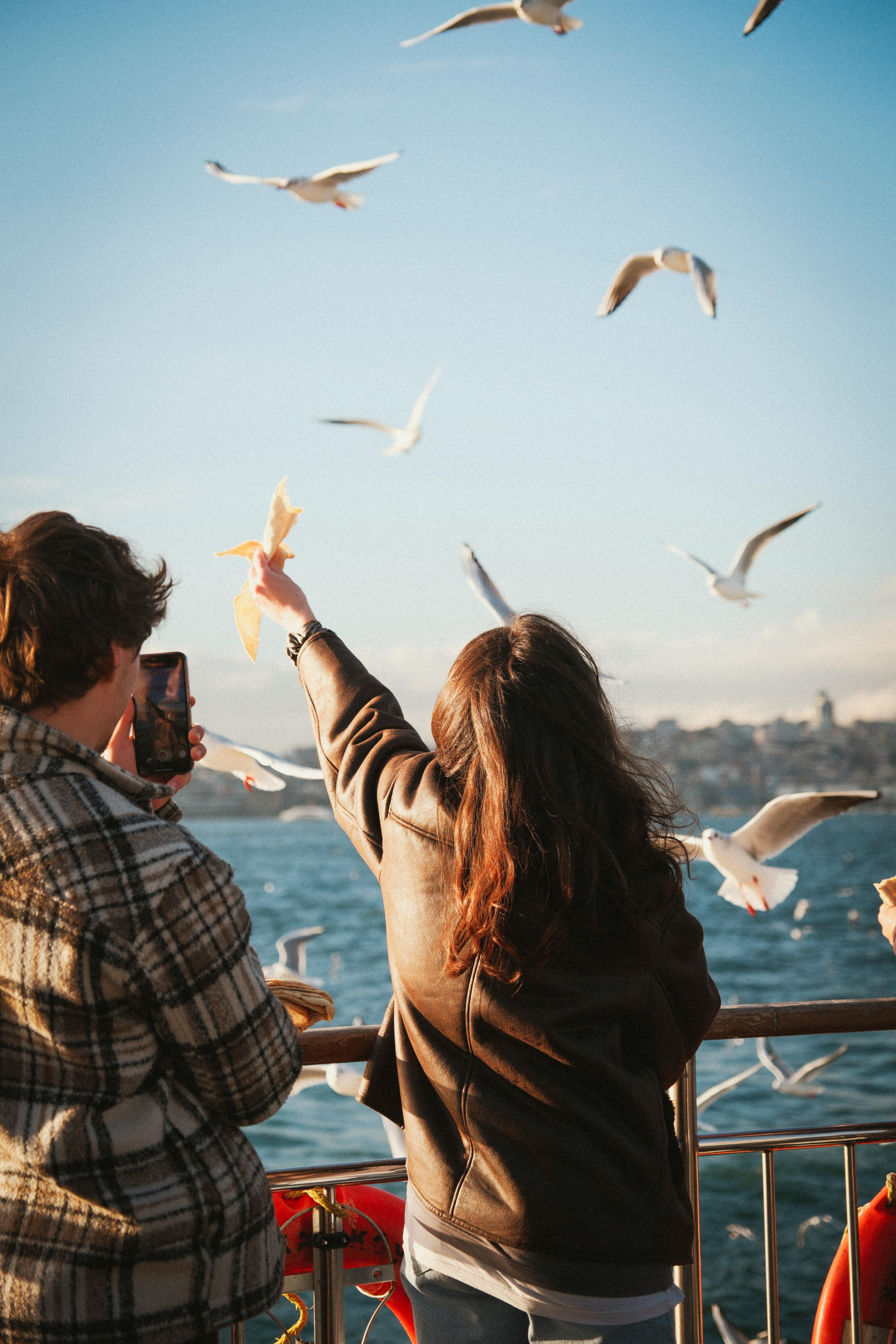 Back View of People Standing on a Ferry on the Bosphorus Strait in ...