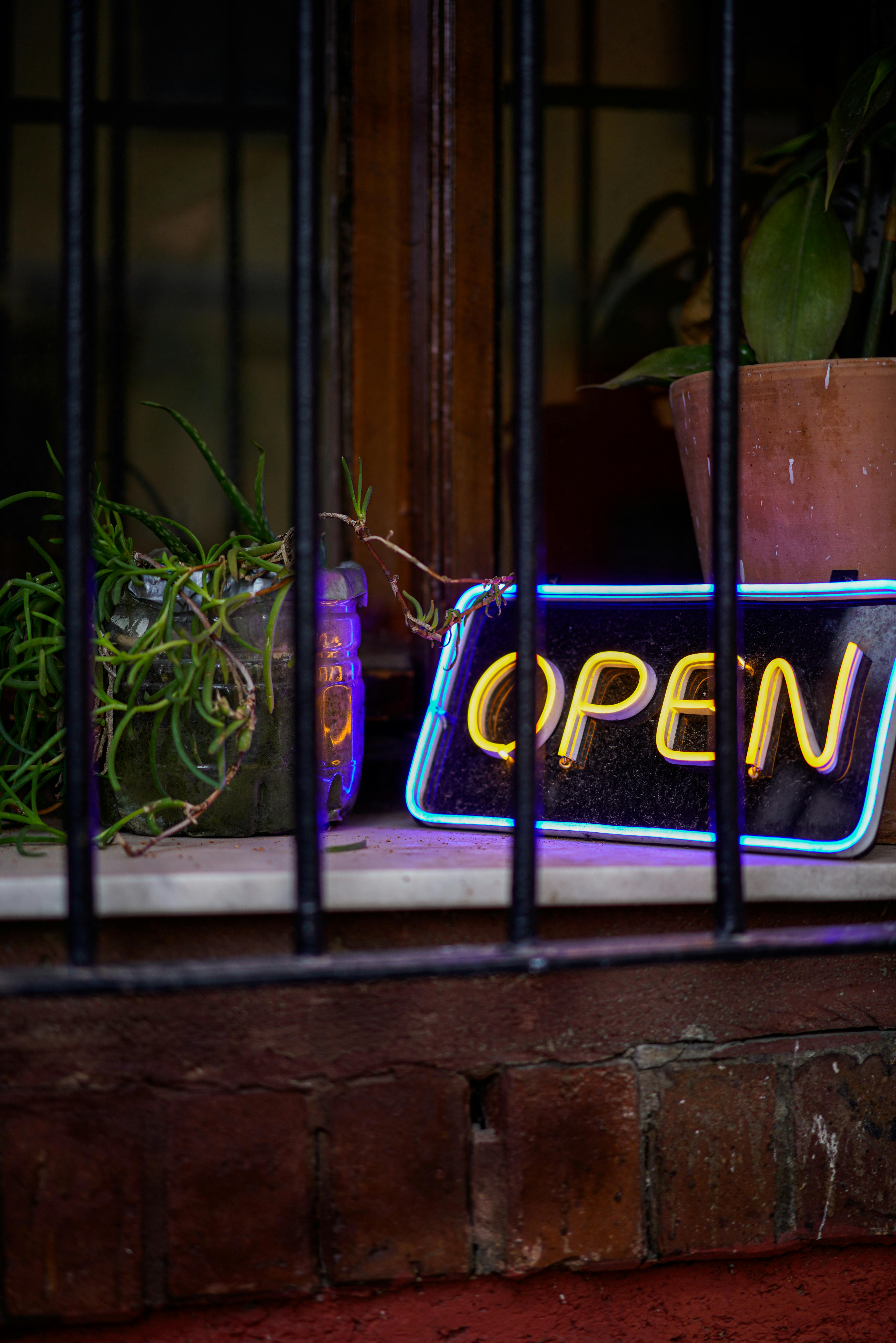 Yellow and Teal Open Neon Signage · Free Stock Photo