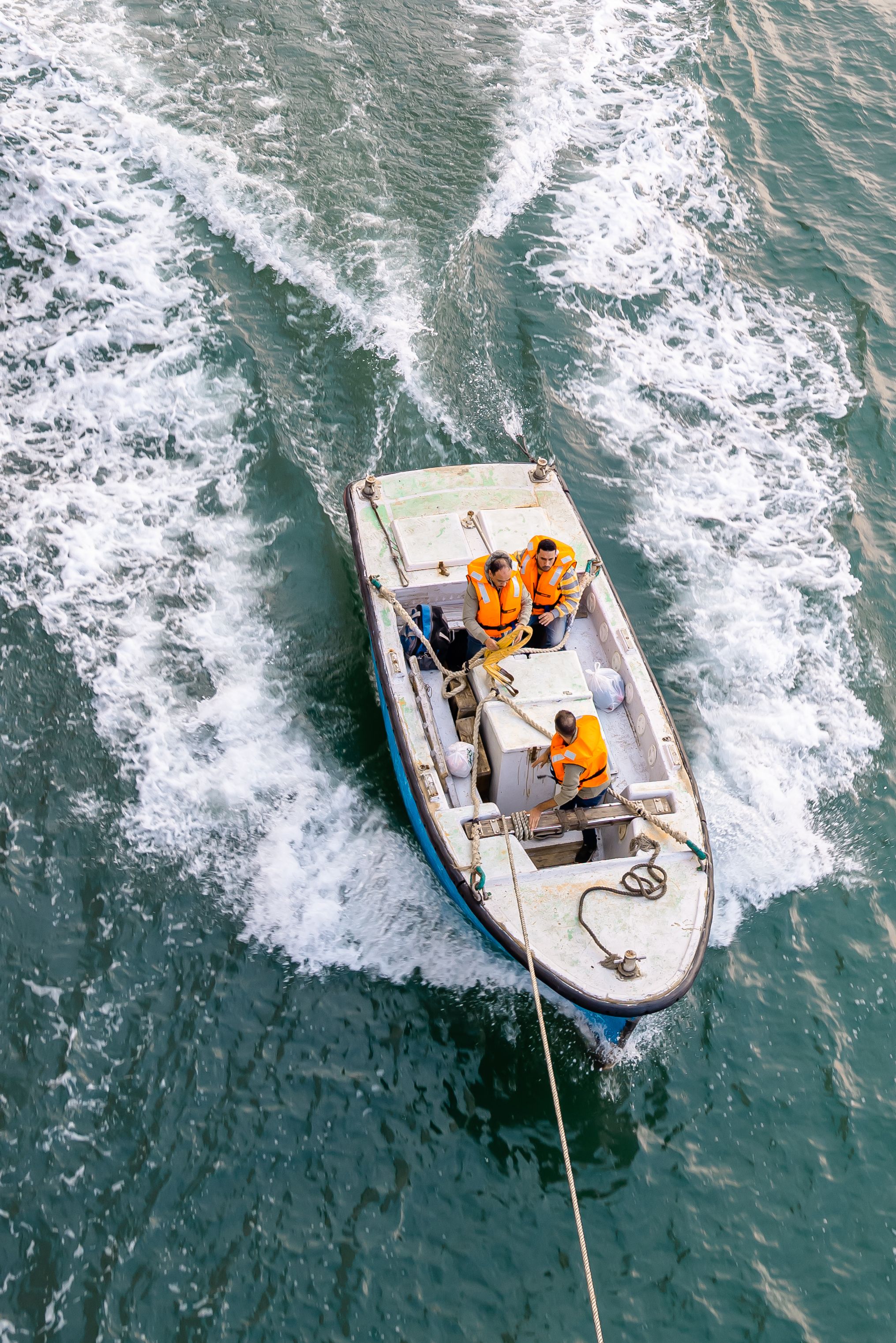 Birds Eye View of People Towed in a Boat · Free Stock Photo