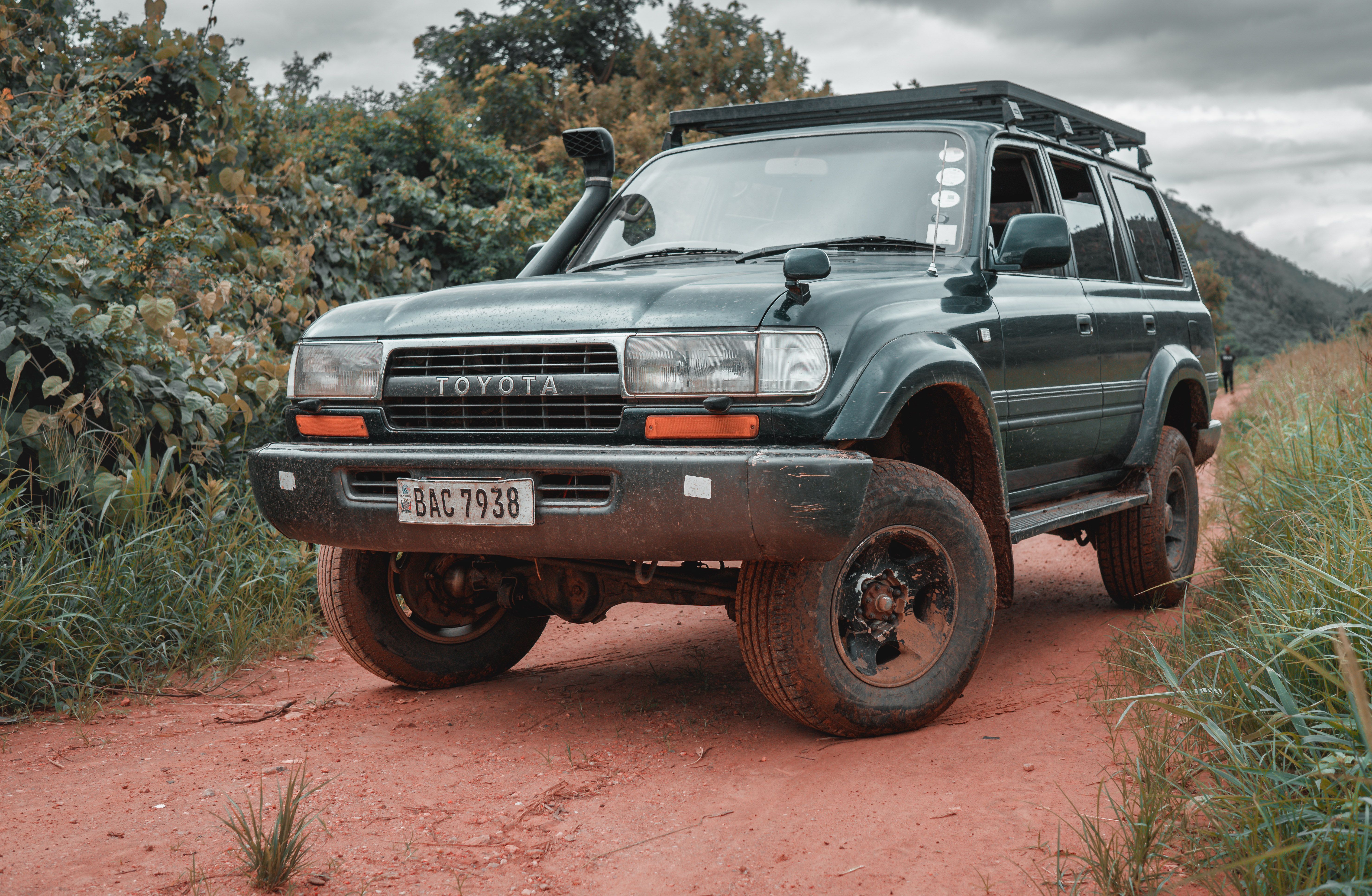 Toyota Land Cruiser on a Muddy Trail · Free Stock Photo