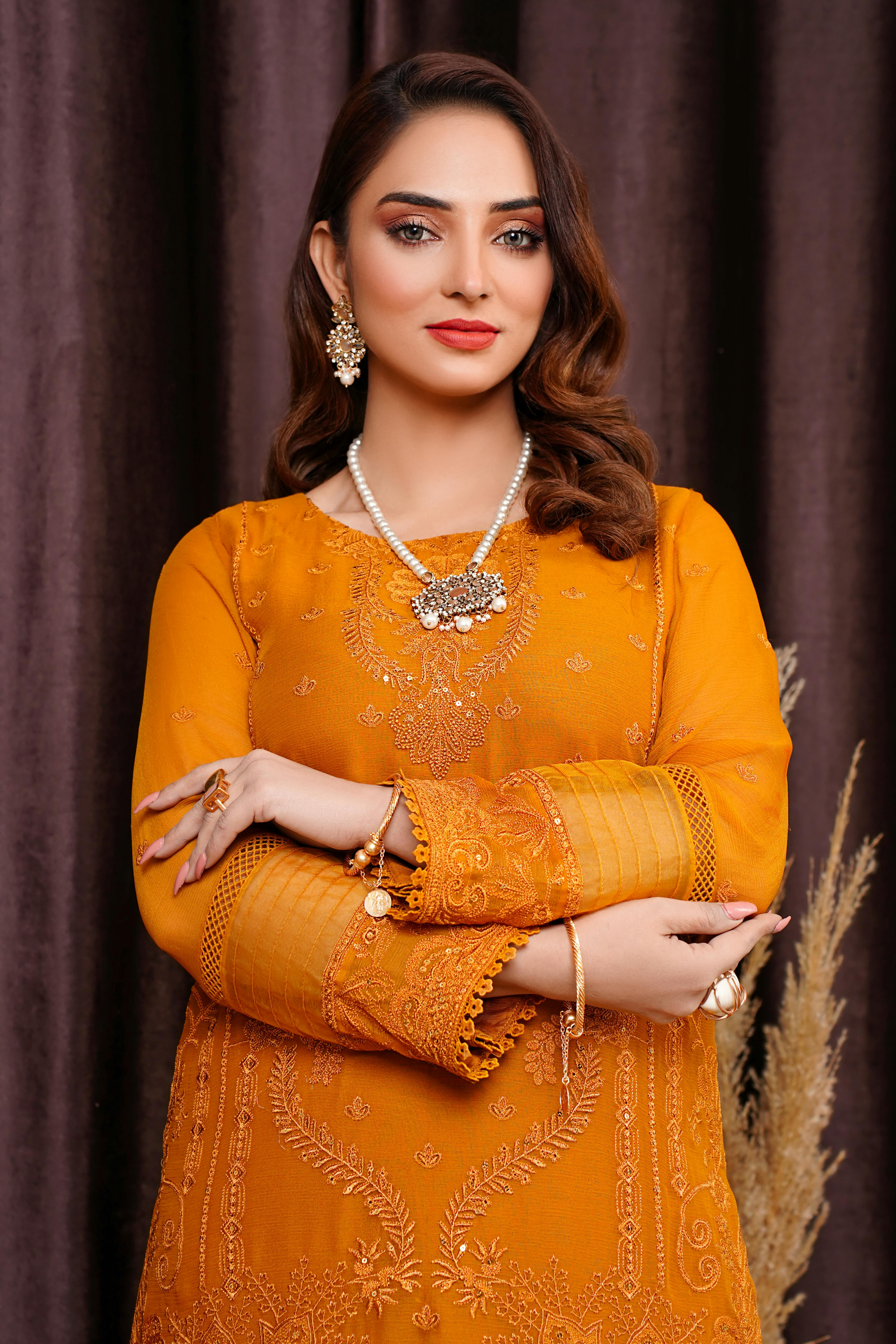 Model in Orange Dress · Free Stock Photo