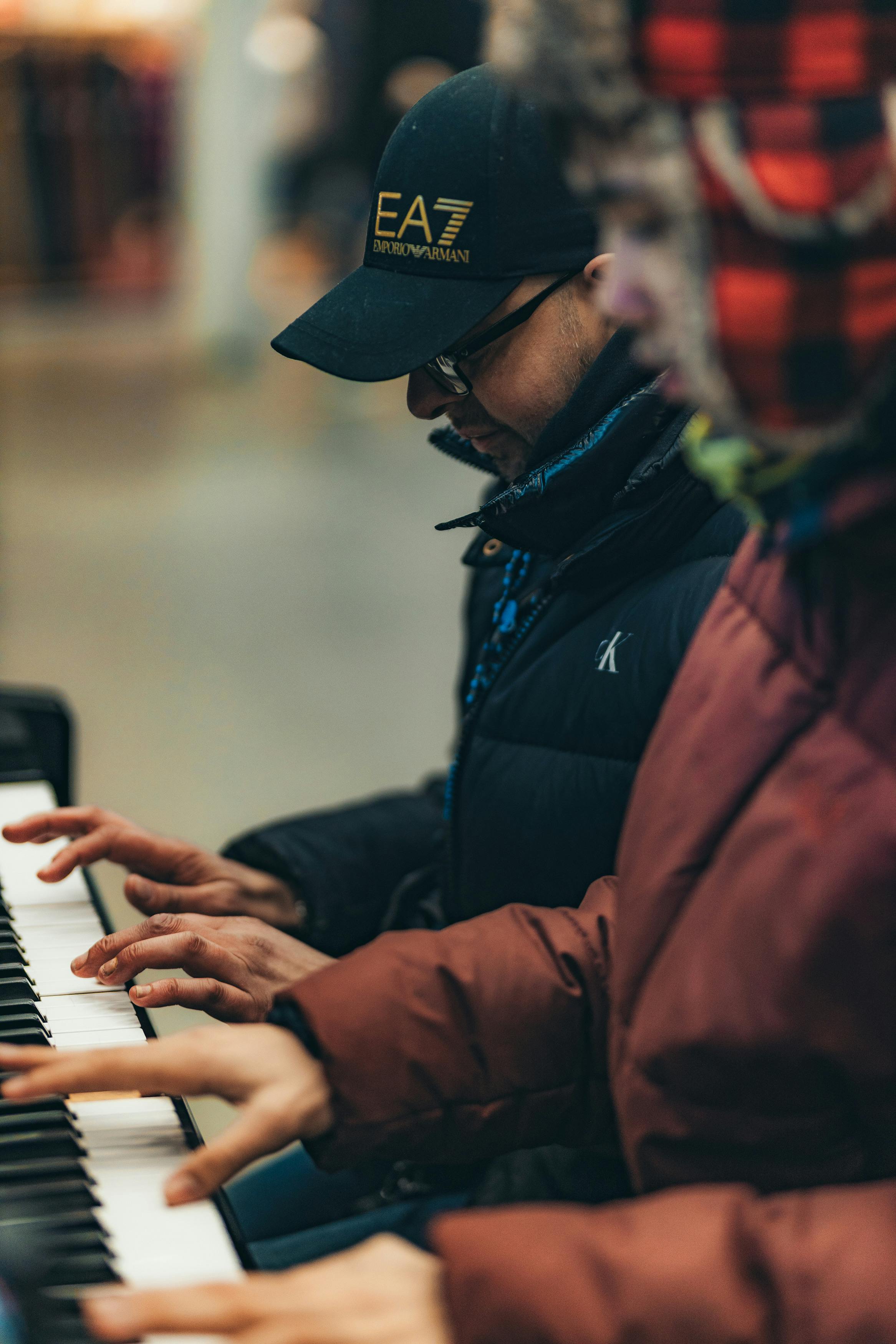 Men Playing Piano Together · Free Stock Photo