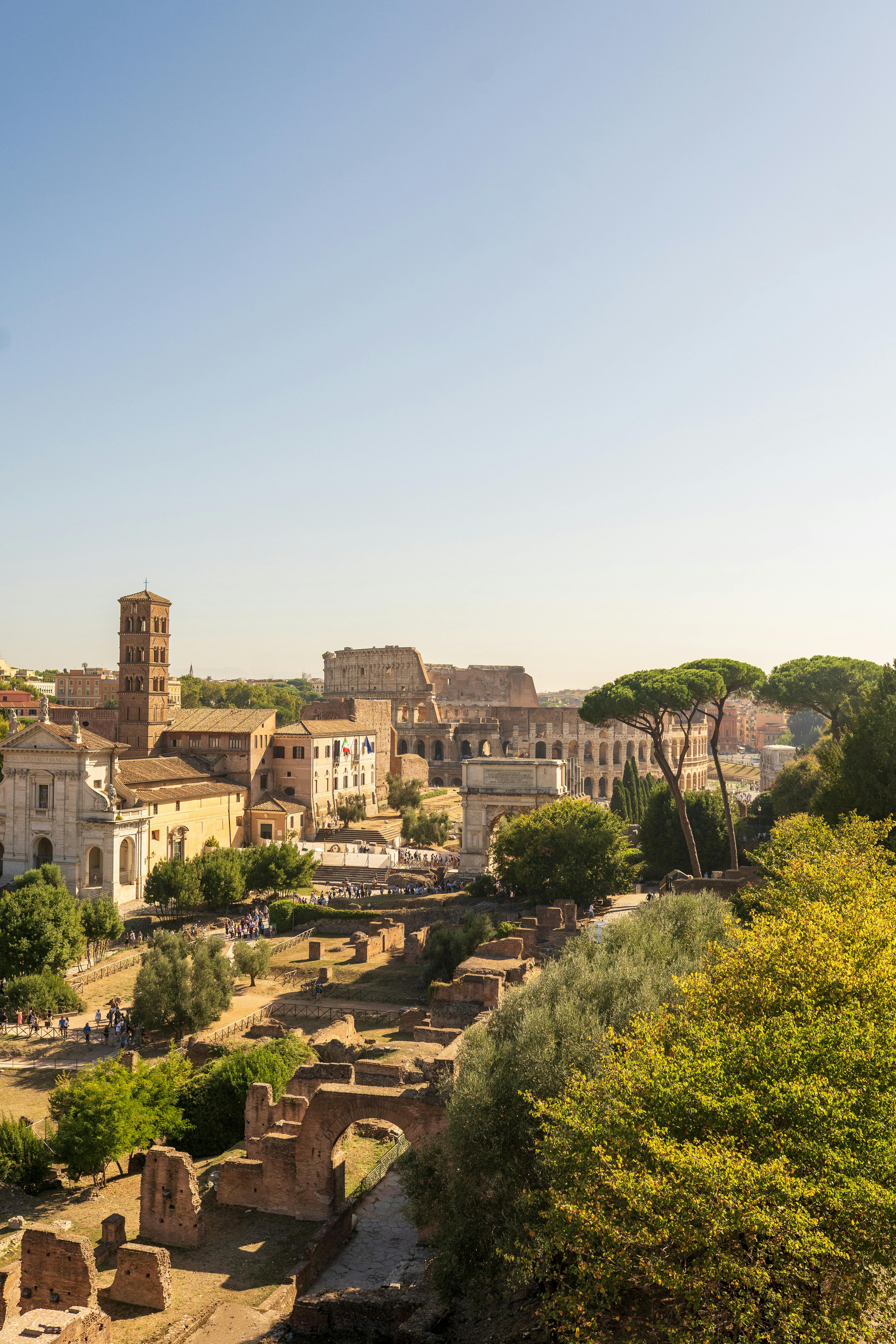 Clear Sky over Ruins of Ancient Rome with Colosseum behind · Free Stock ...