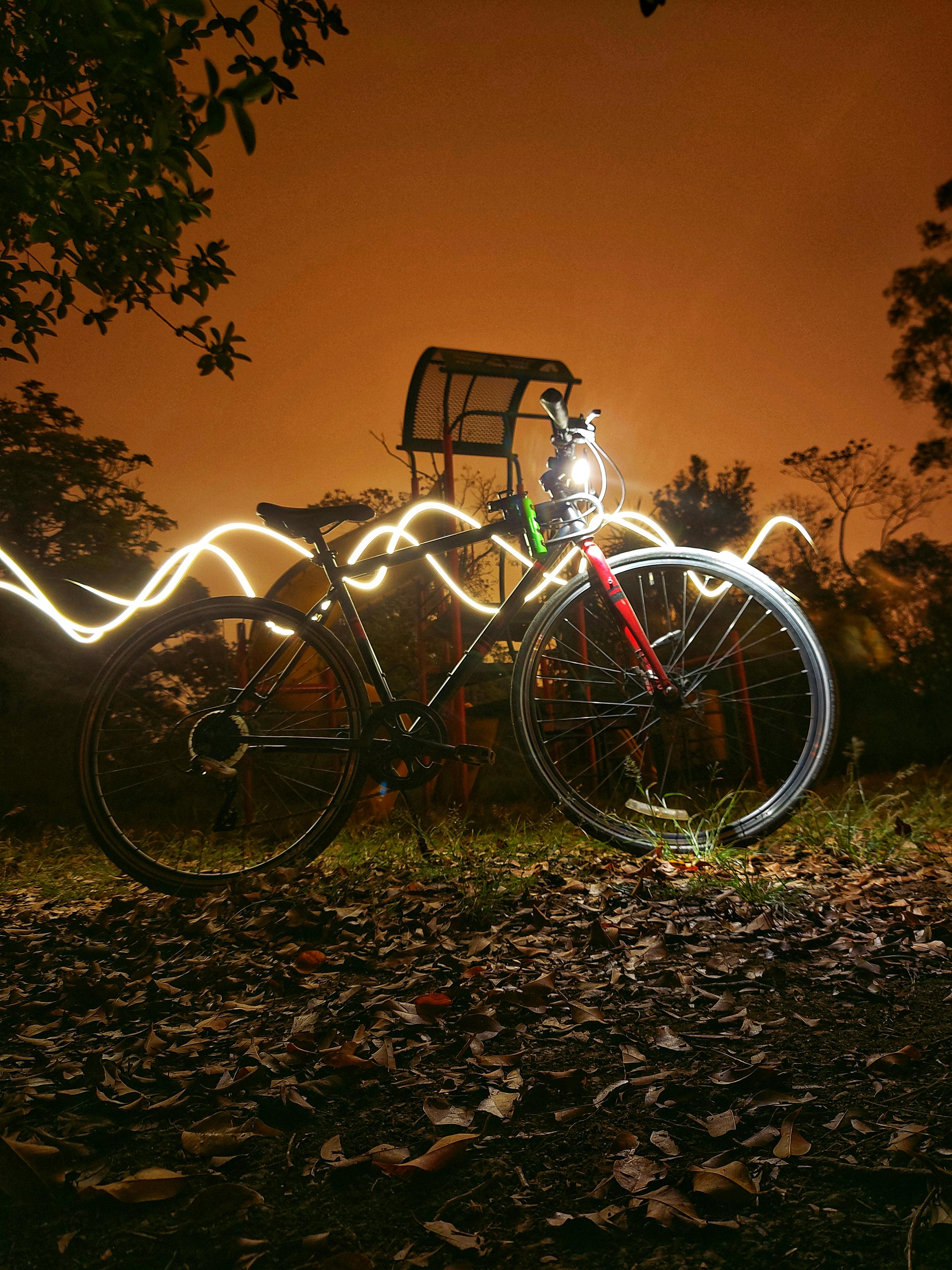 Photo of a Bicycle with Lights at Dusk · Free Stock Photo
