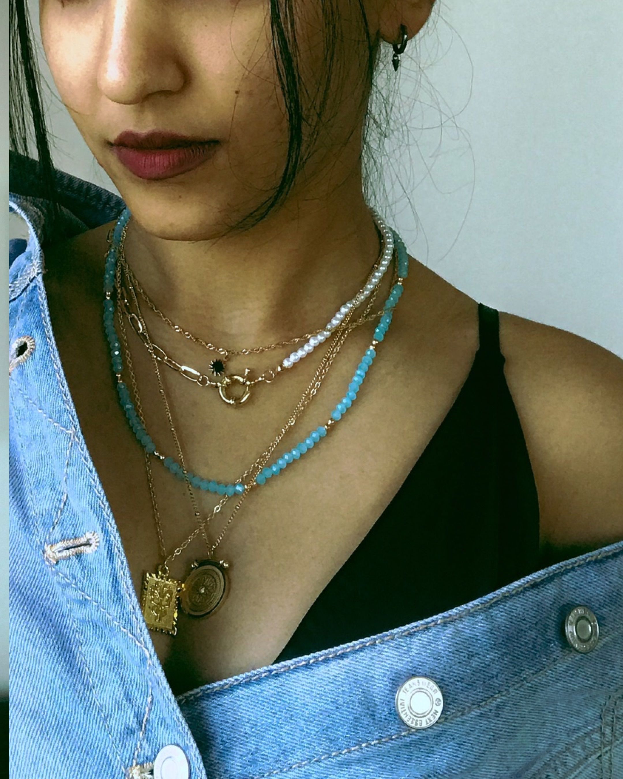 Woman Wearing a Bra and a Denim Jacket · Free Stock Photo