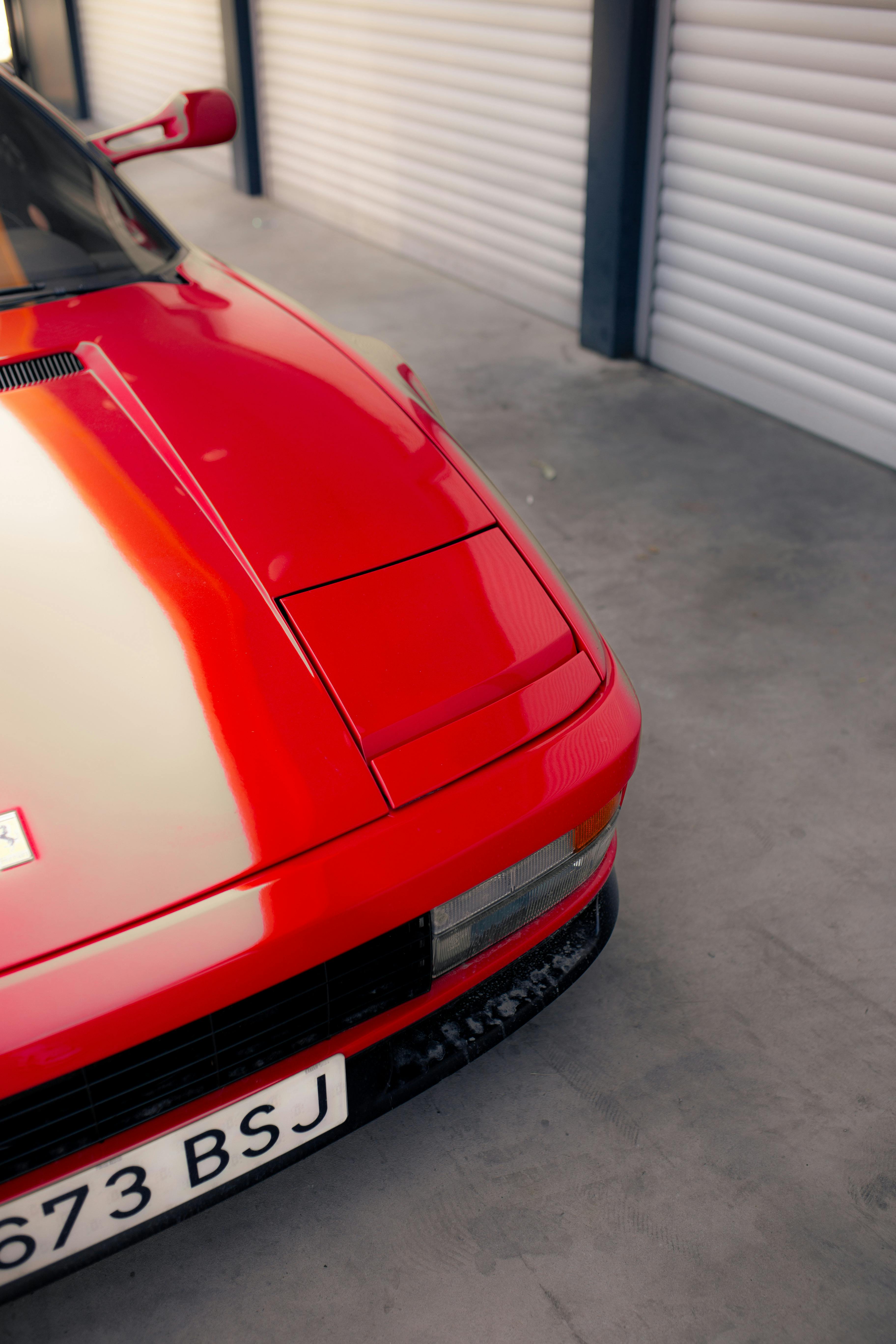 Red Ferrari Testarossa and White Lamborghini Countach · Free Stock Photo