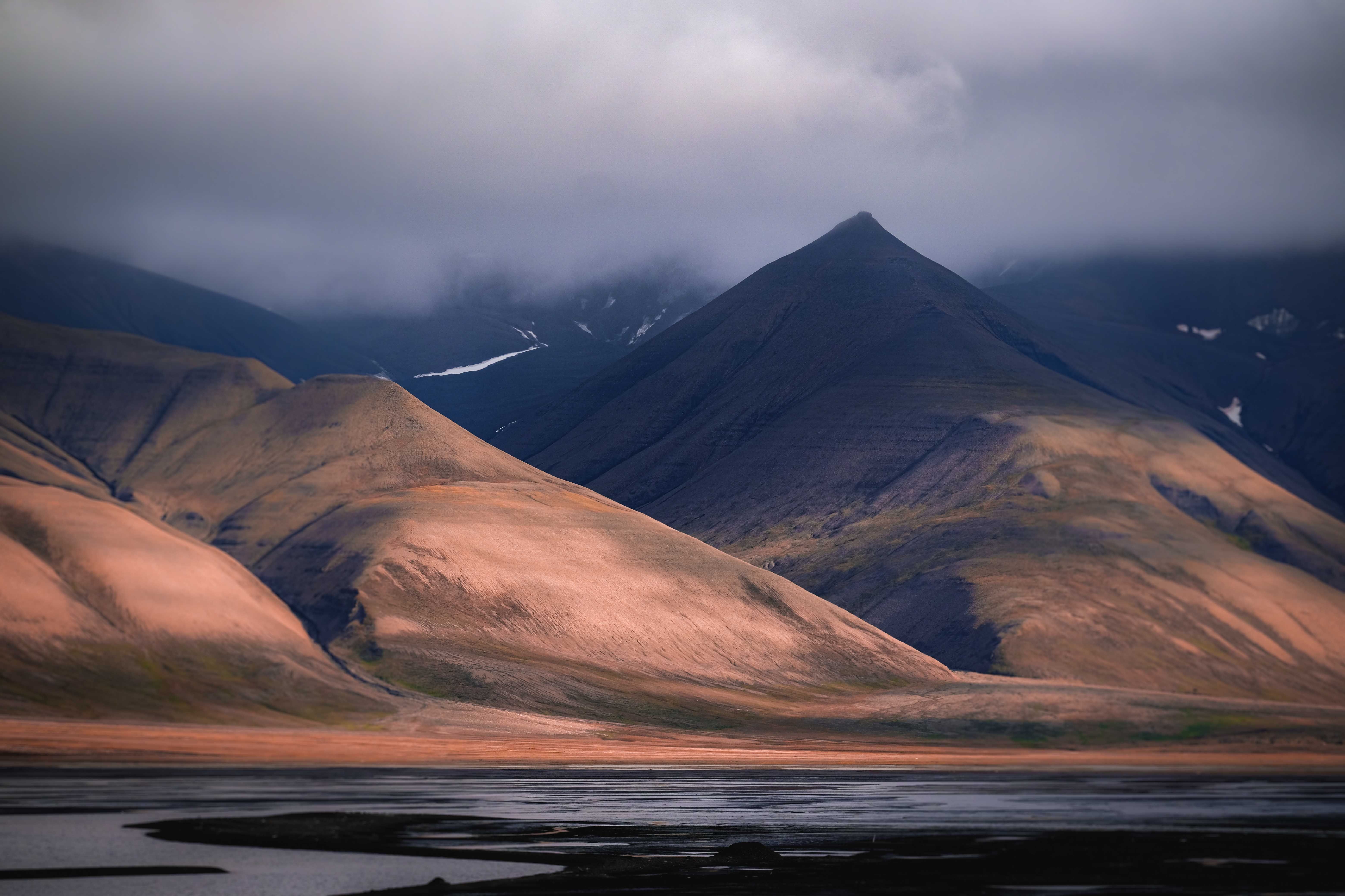 A view of mountains and water in iceland · Free Stock Photo
