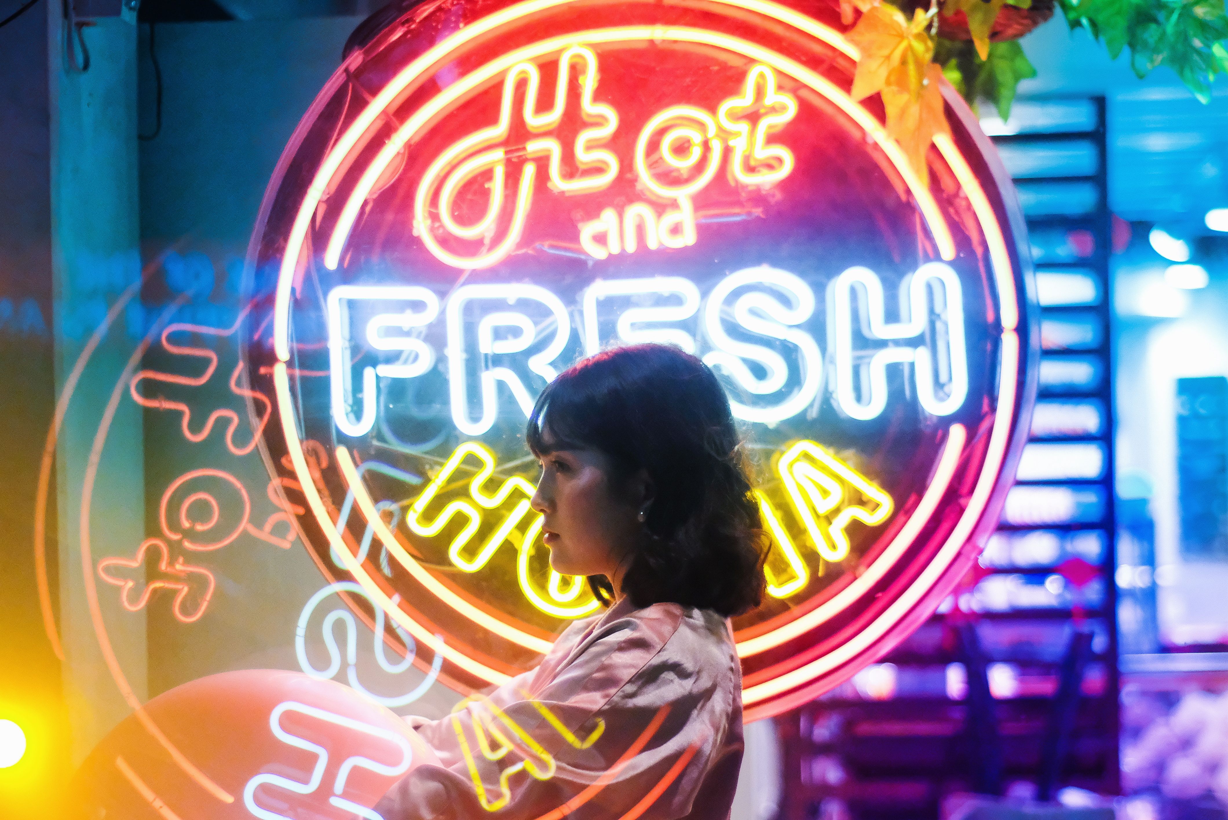 Woman Standing Beside Led Signage · Free Stock Photo