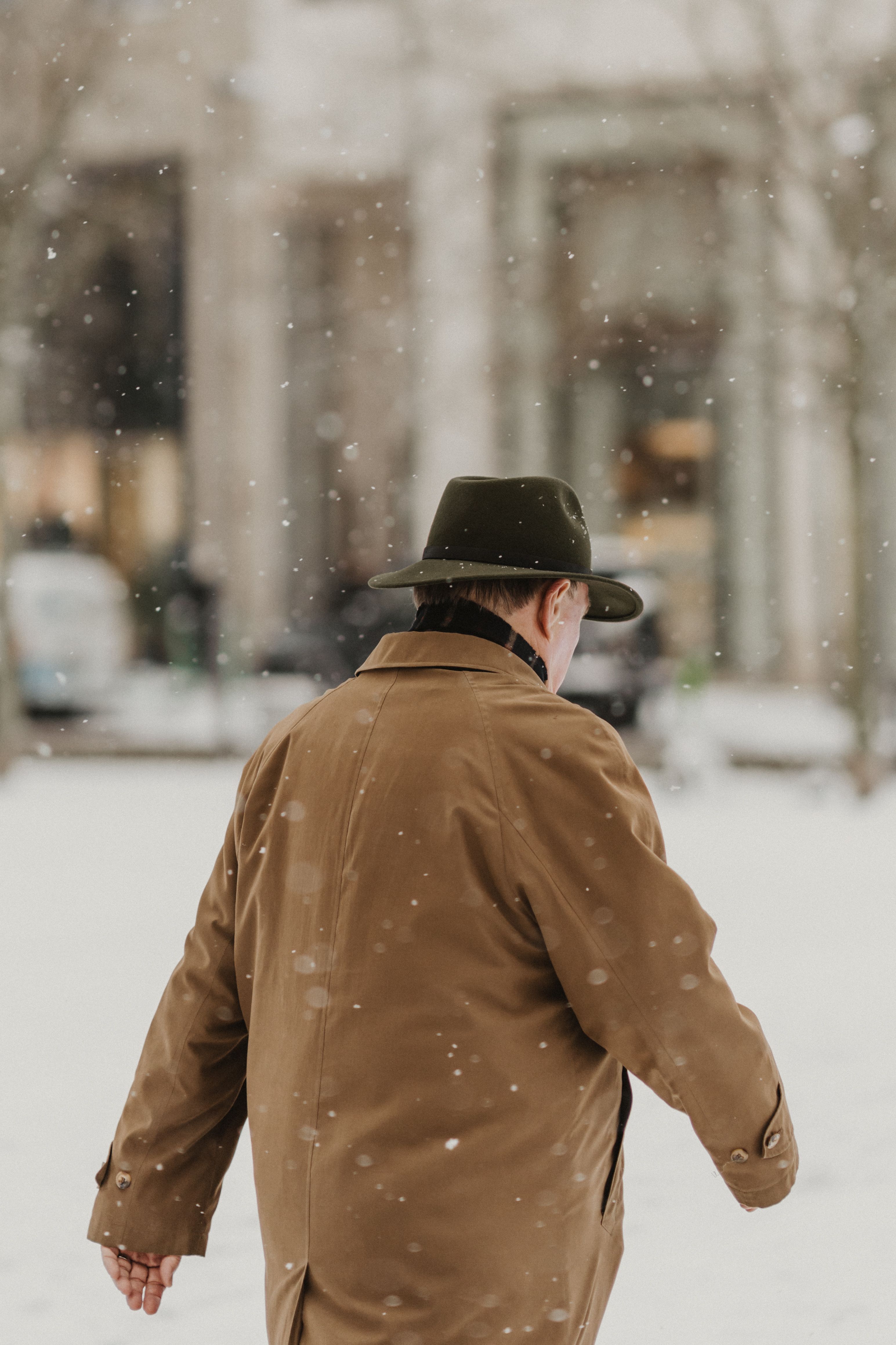 A Man Walking Outdoors in Winter · Free Stock Photo