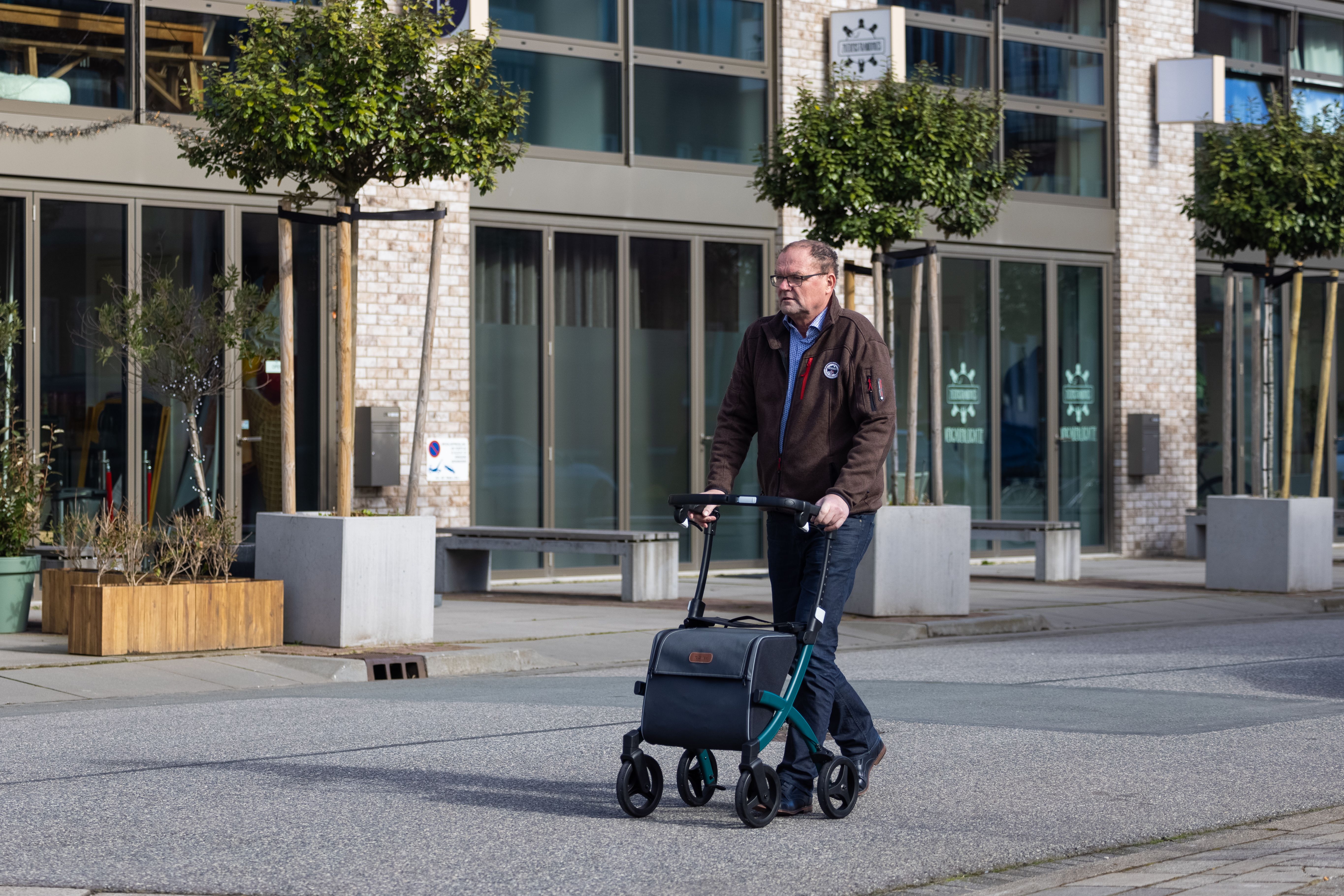 Photo of a Man with a Rollator Walker · Free Stock Photo
