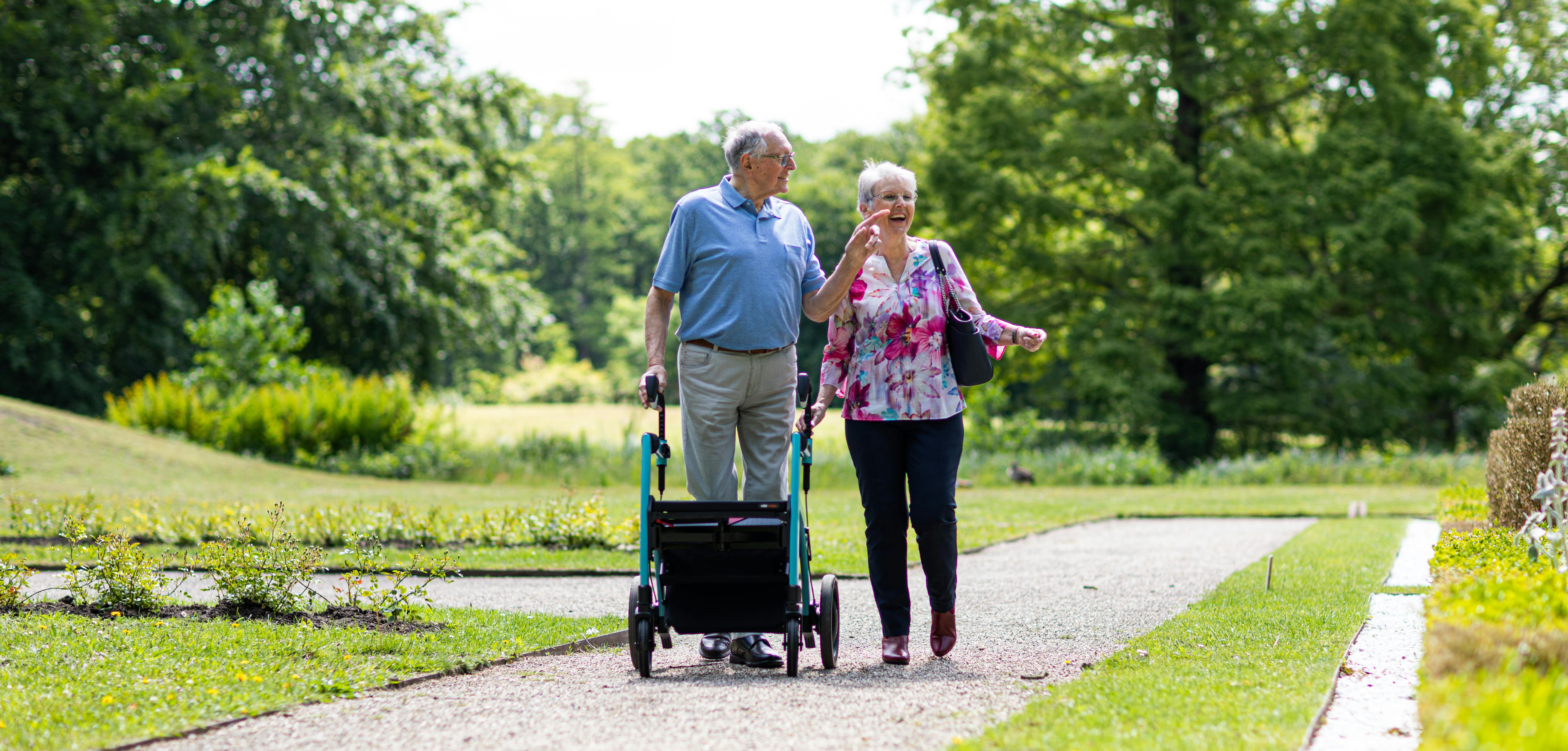 Elderly People Walking with a Rollator Walking Aid in a Park · Free ...