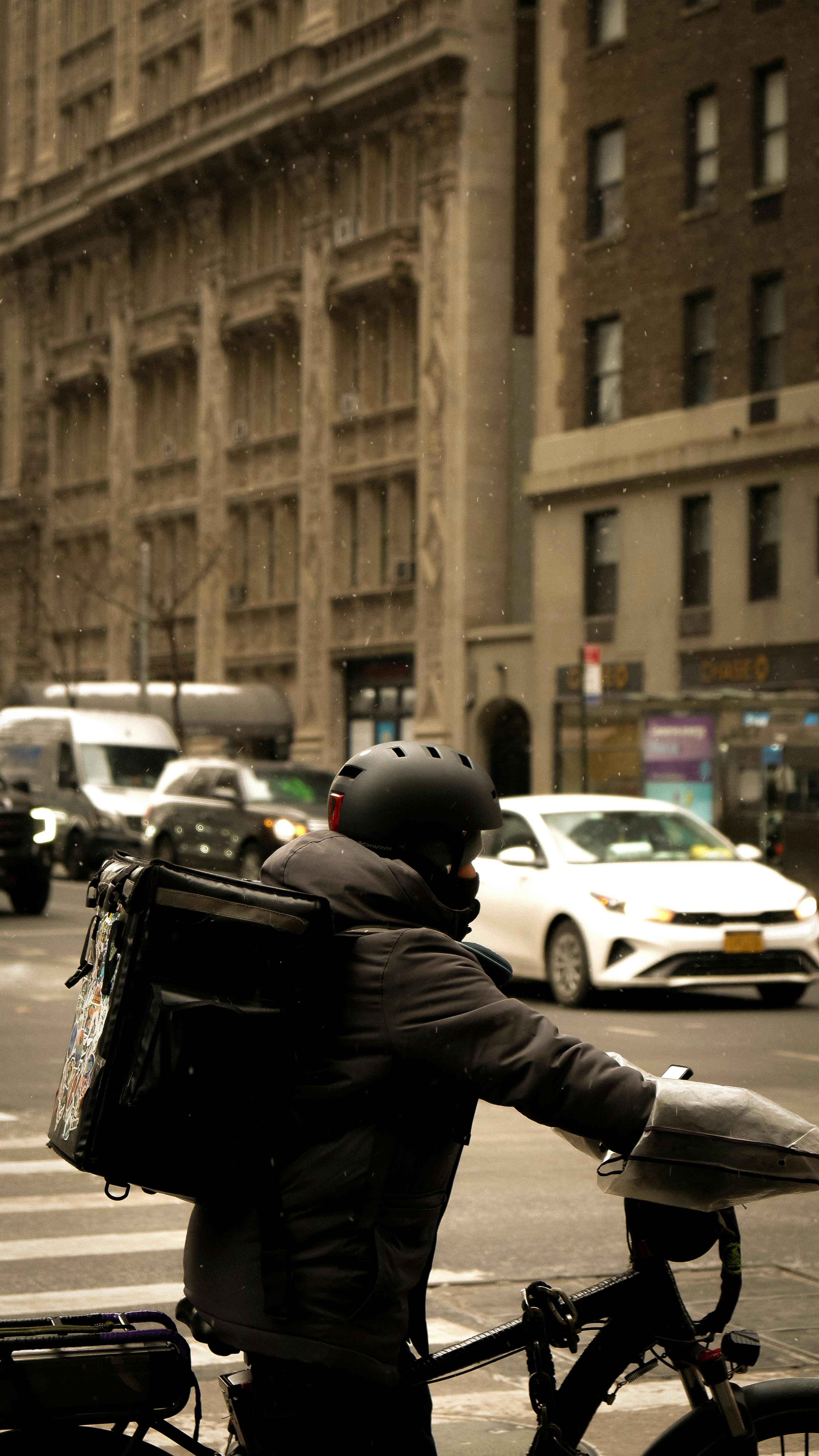 Delivery Girl Sitting on Street Stairs and Resting · Free Stock Photo