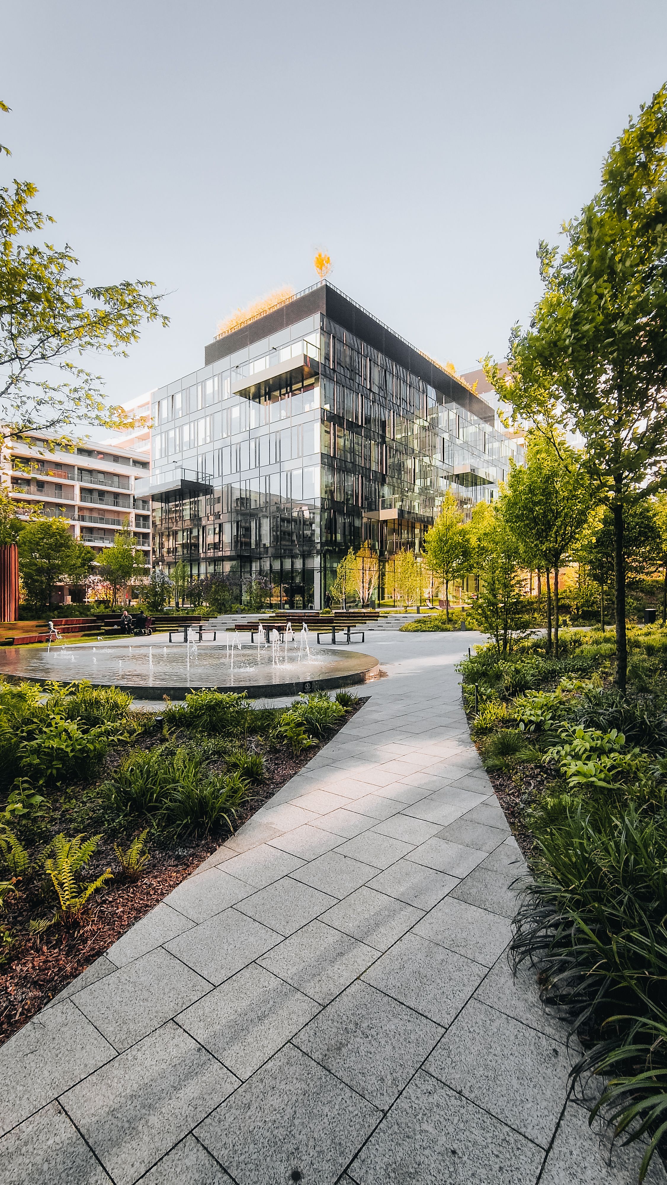 A walkway in front of a modern building · Free Stock Photo