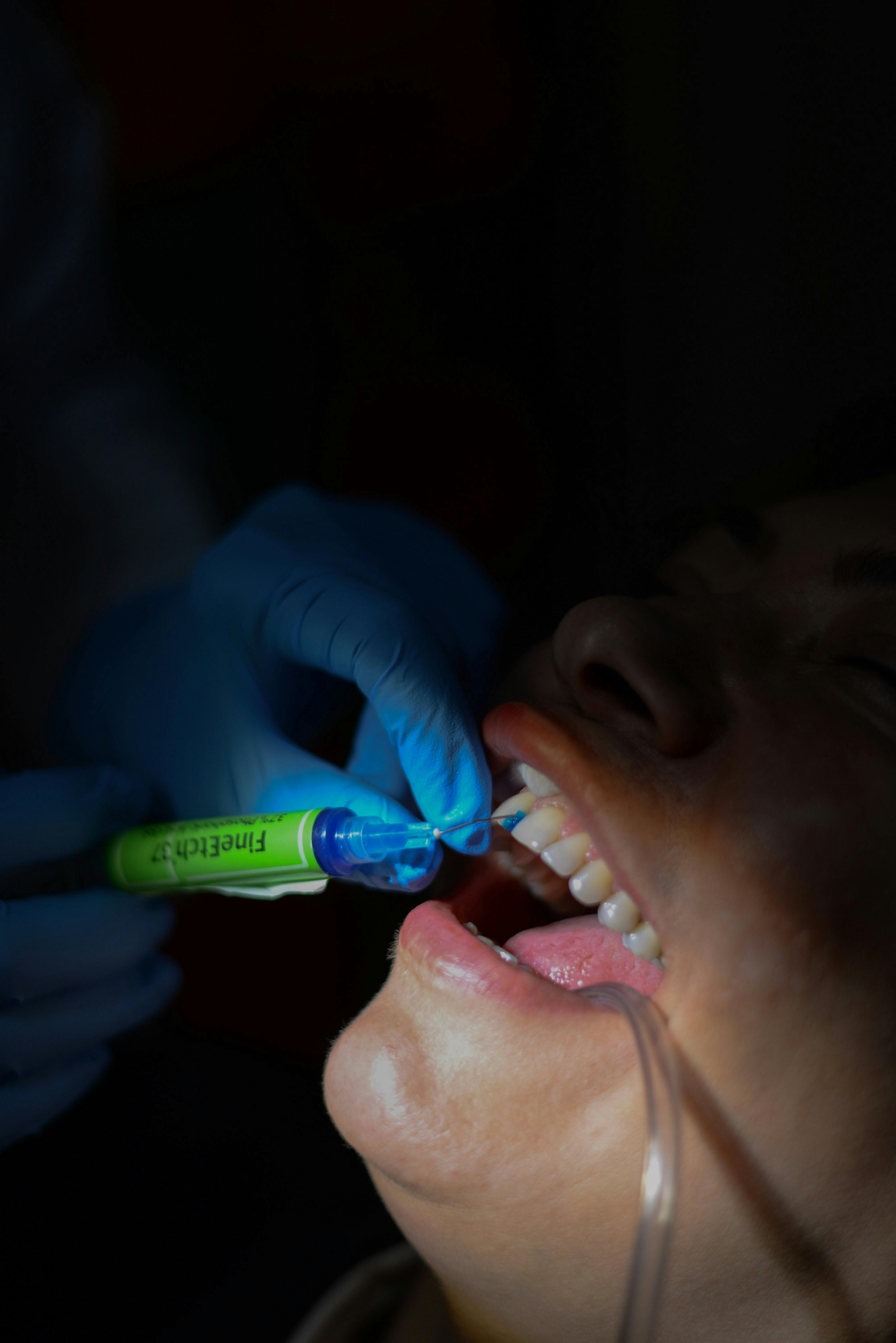 Dentist Applying Injection to Patient · Free Stock Photo