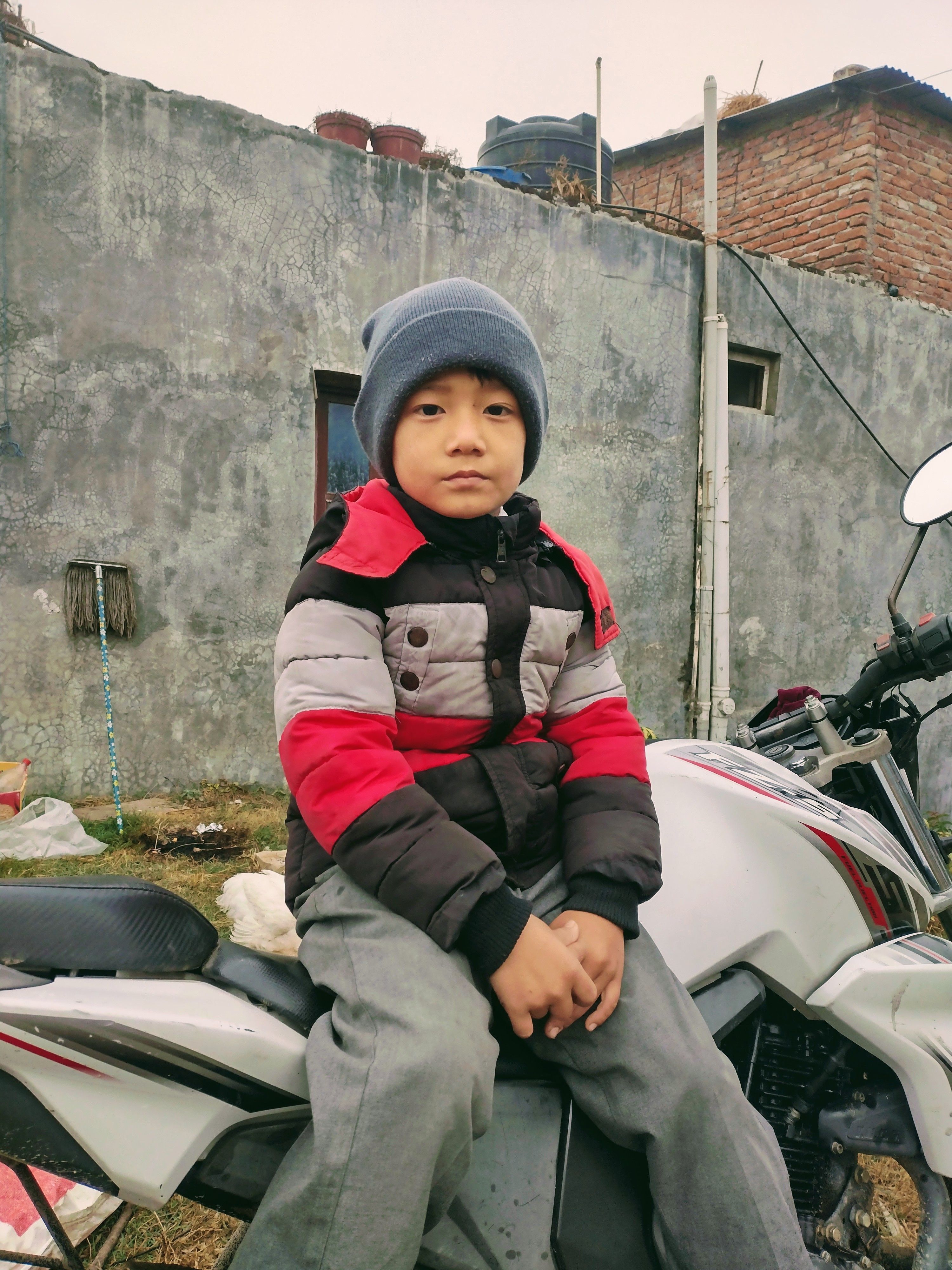 A Boy Riding a Motorcycle · Free Stock Photo