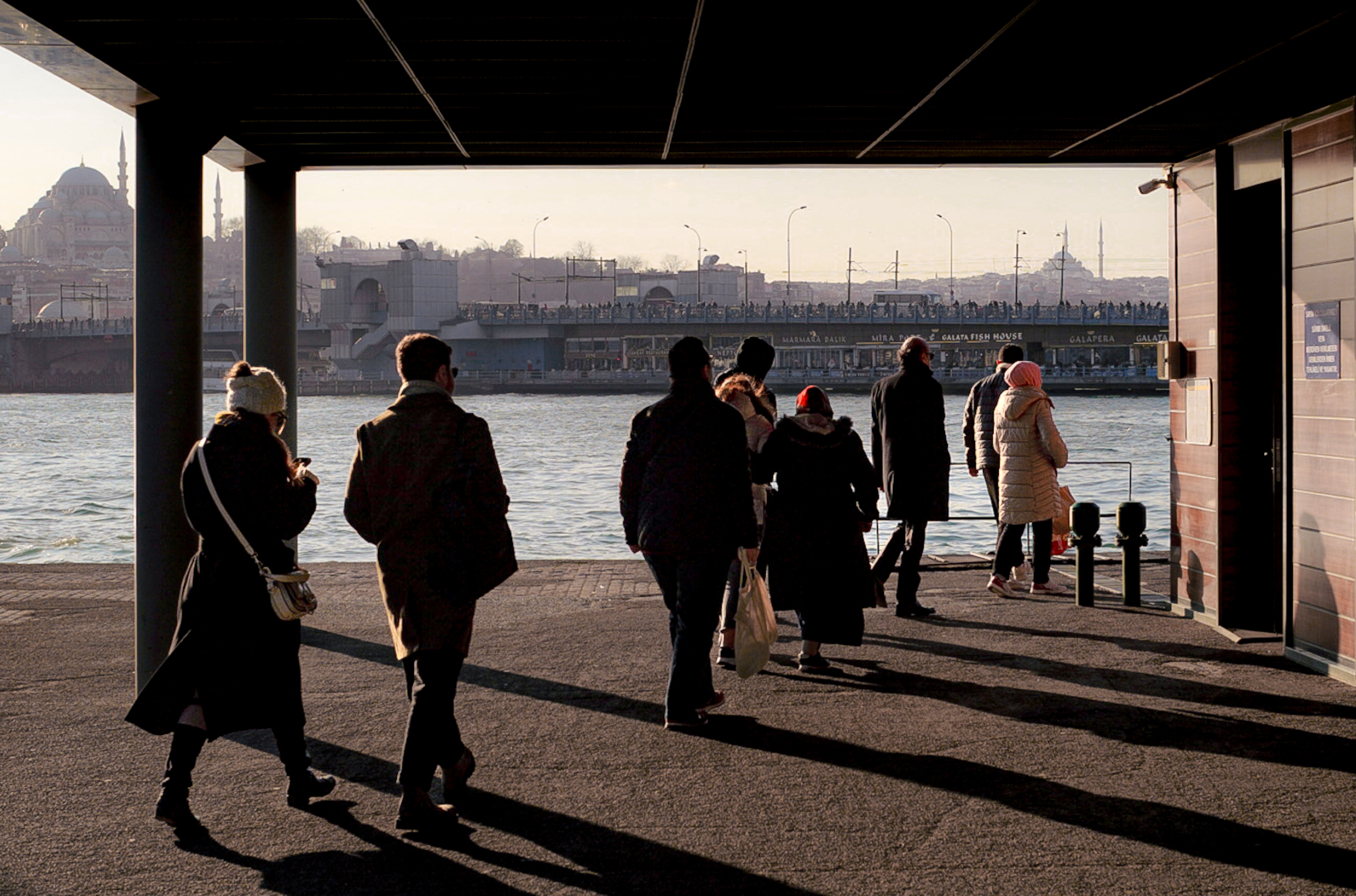 Group Walking next to River · Free Stock Photo