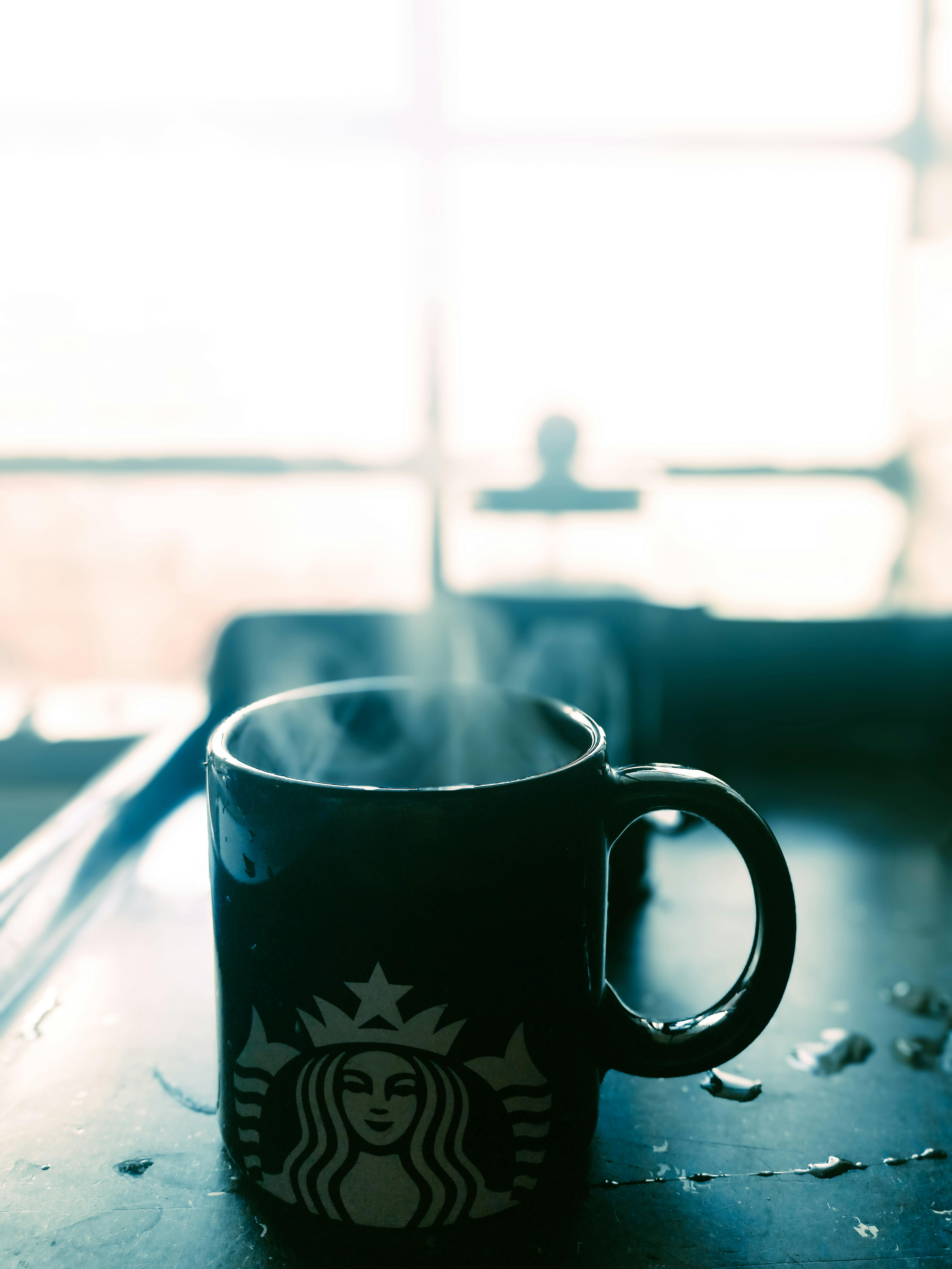 Steaming Hot Coffee in a Starbucks Mug · Free Stock Photo