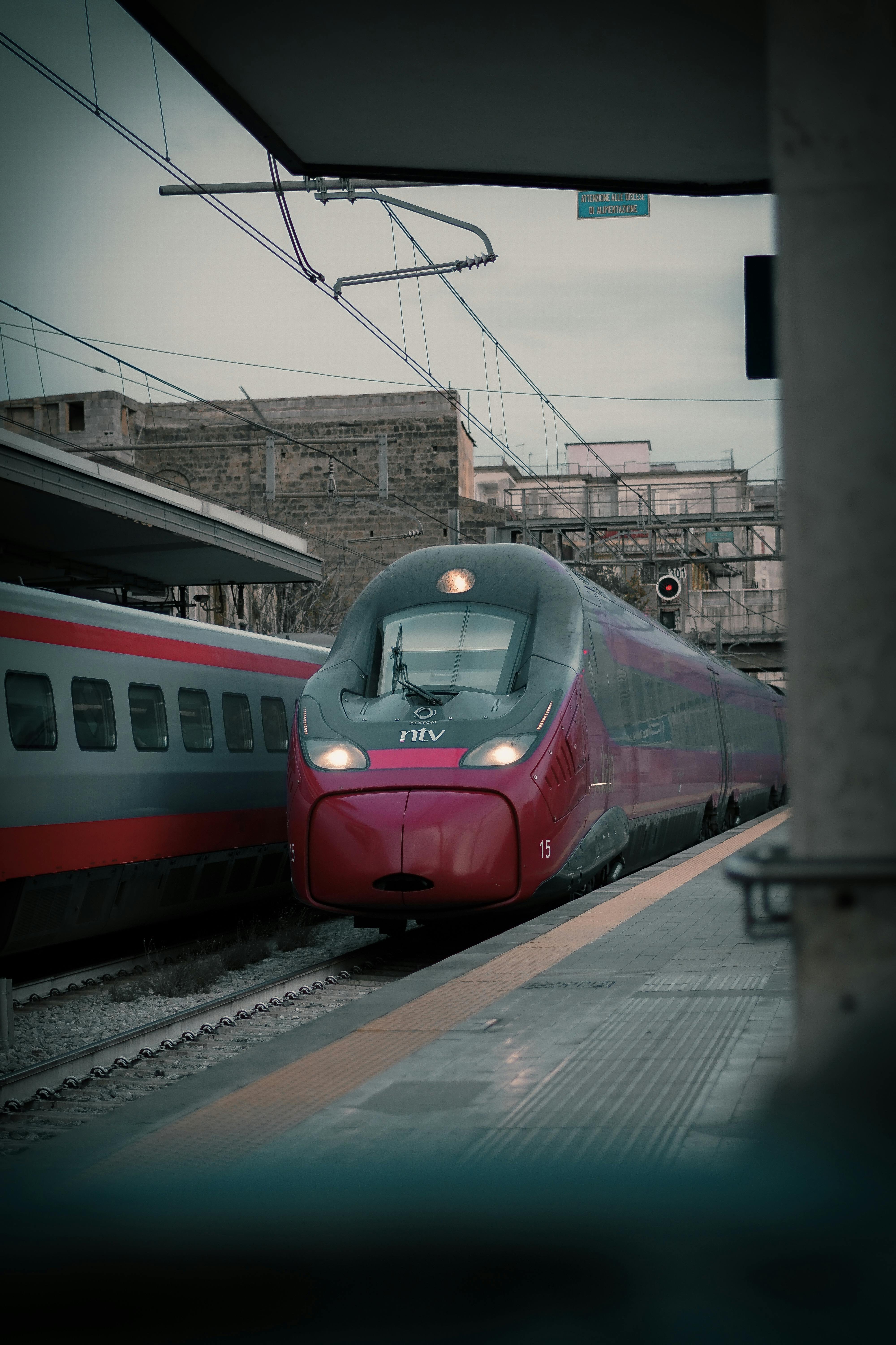 Photo of Two Red Trains · Free Stock Photo