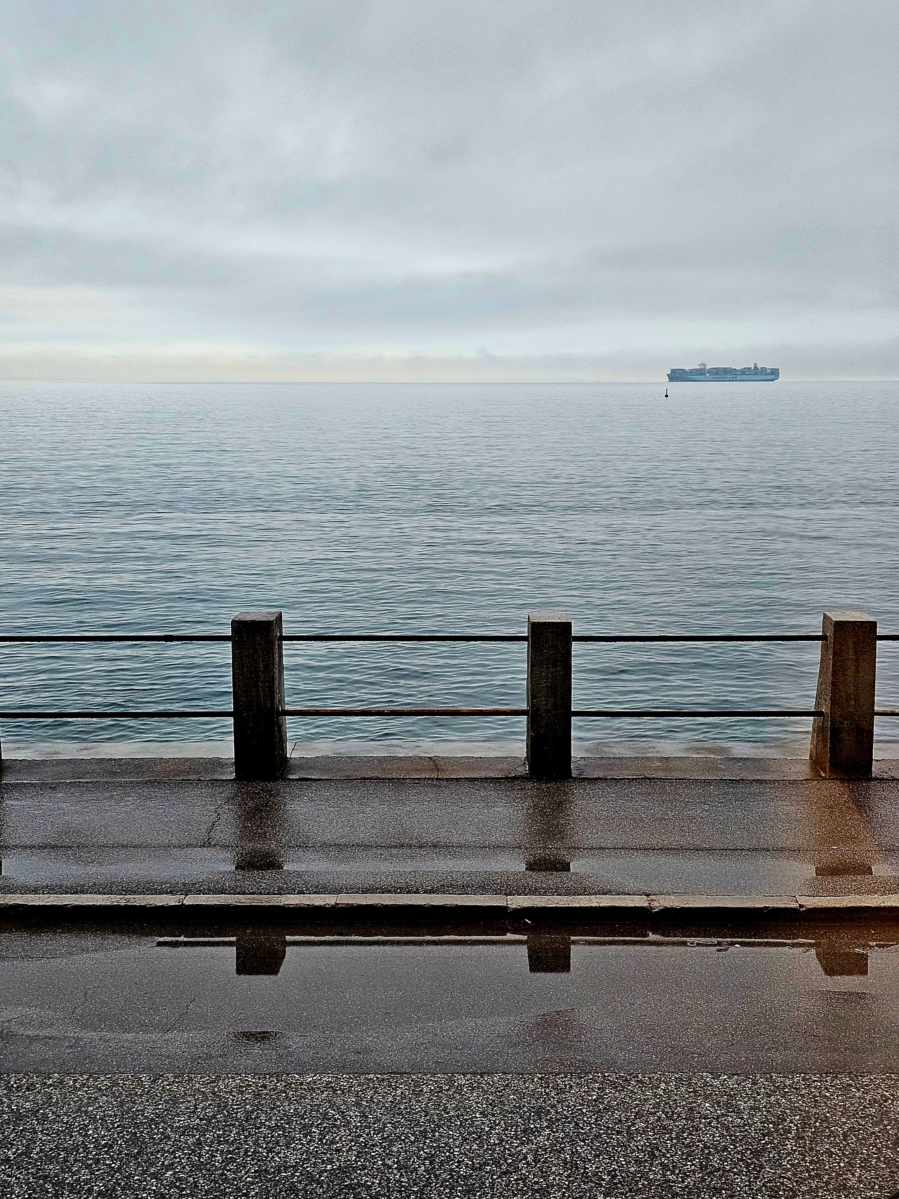 Wet Promenade on Sea Shore after Rain · Free Stock Photo